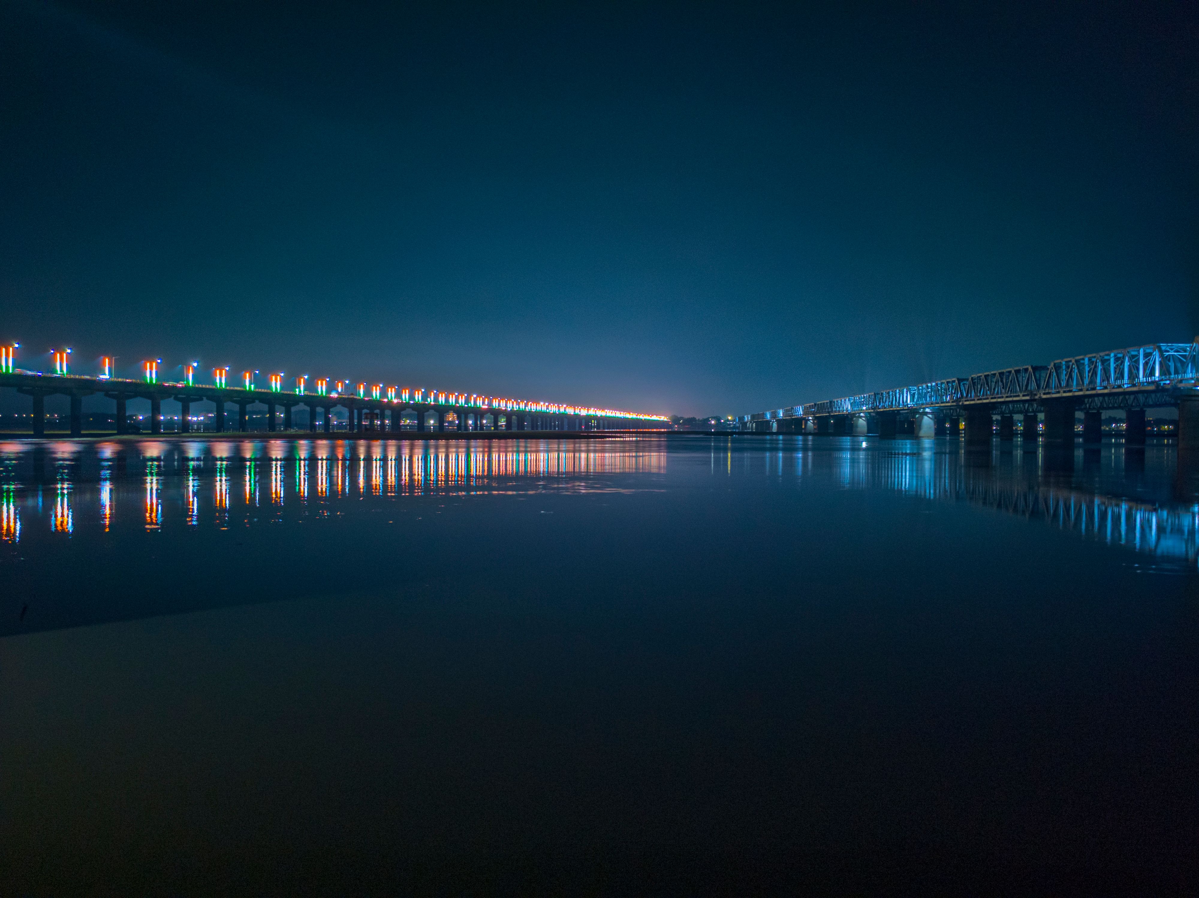 Illuminated Night View of a Long Bridge · Free Stock Photo