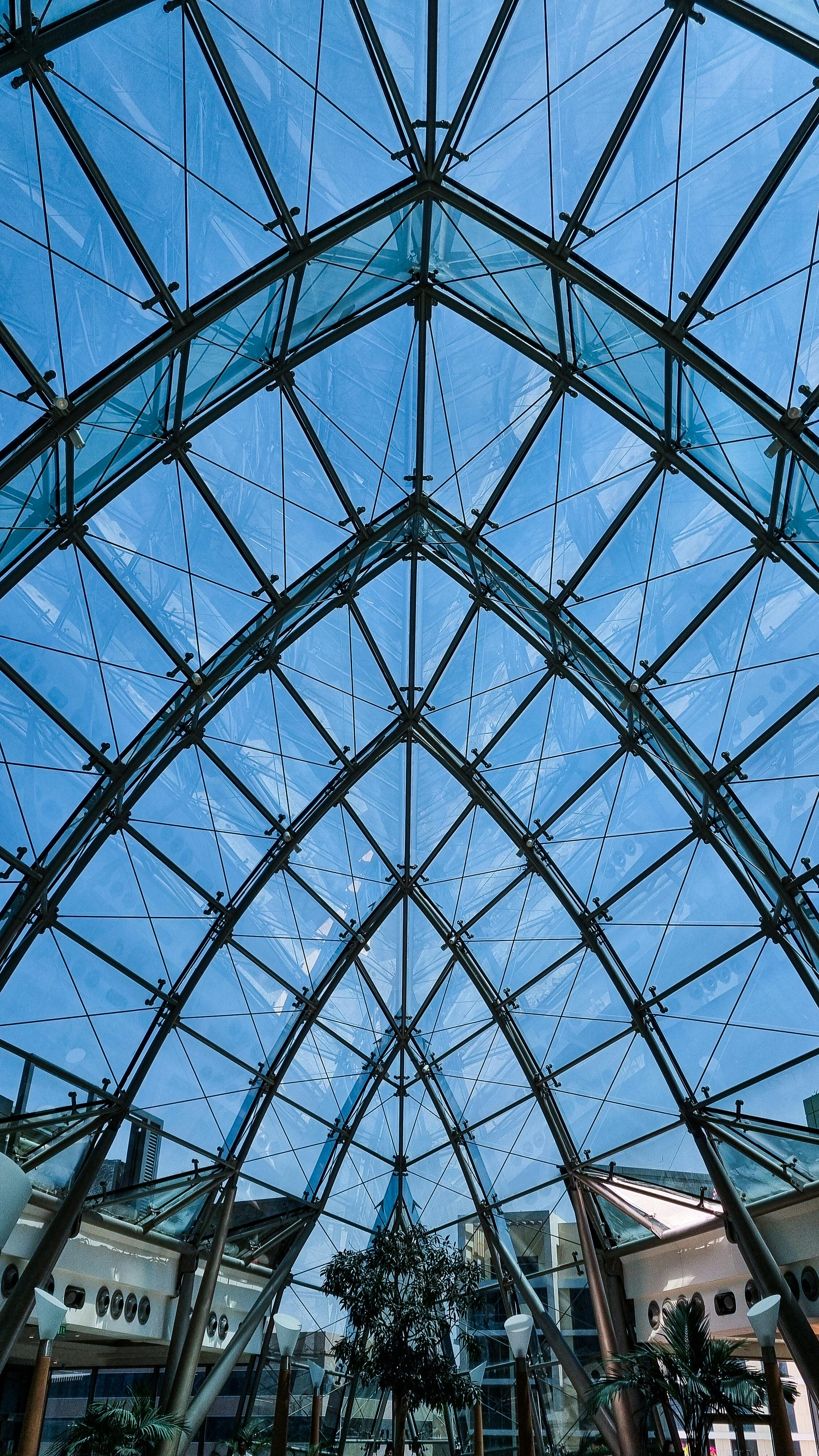 Modern Glass Ceiling Architecture with Blue Sky View · Free Stock Photo