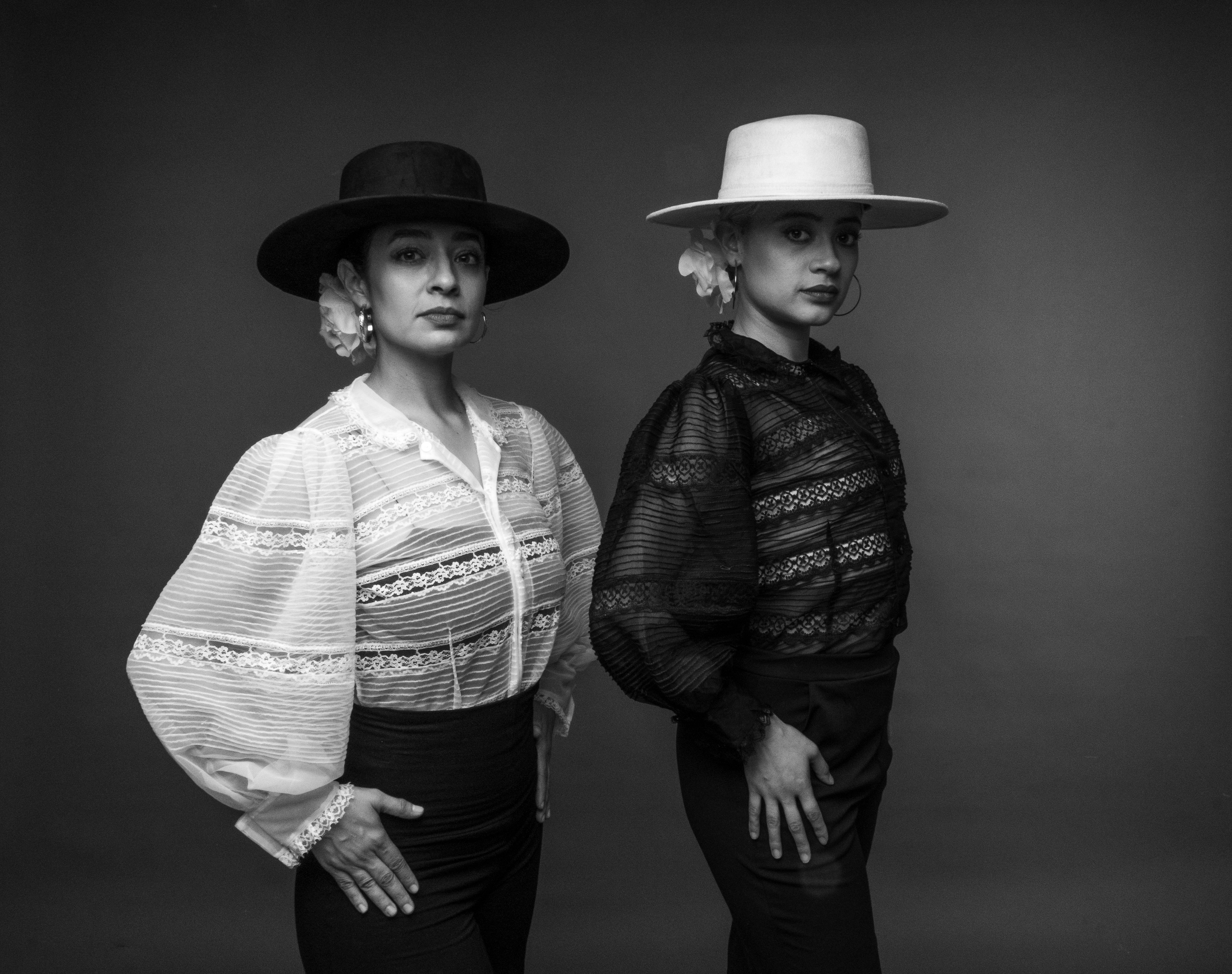 Elegant Flamenco Dancers in Traditional Attire · Free Stock Photo