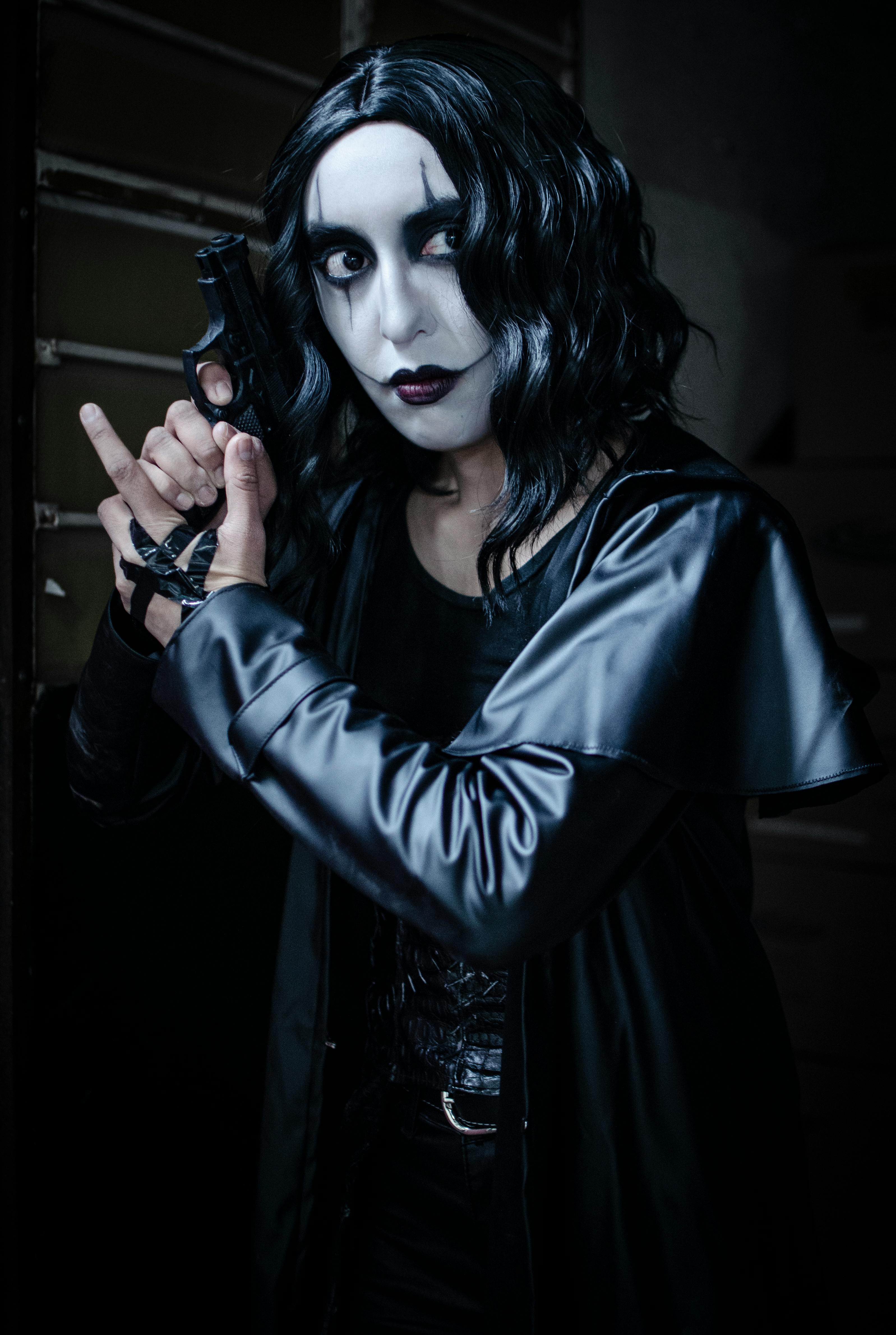 Gothic Hunter with Dramatic Makeup Costume · Free Stock Photo
