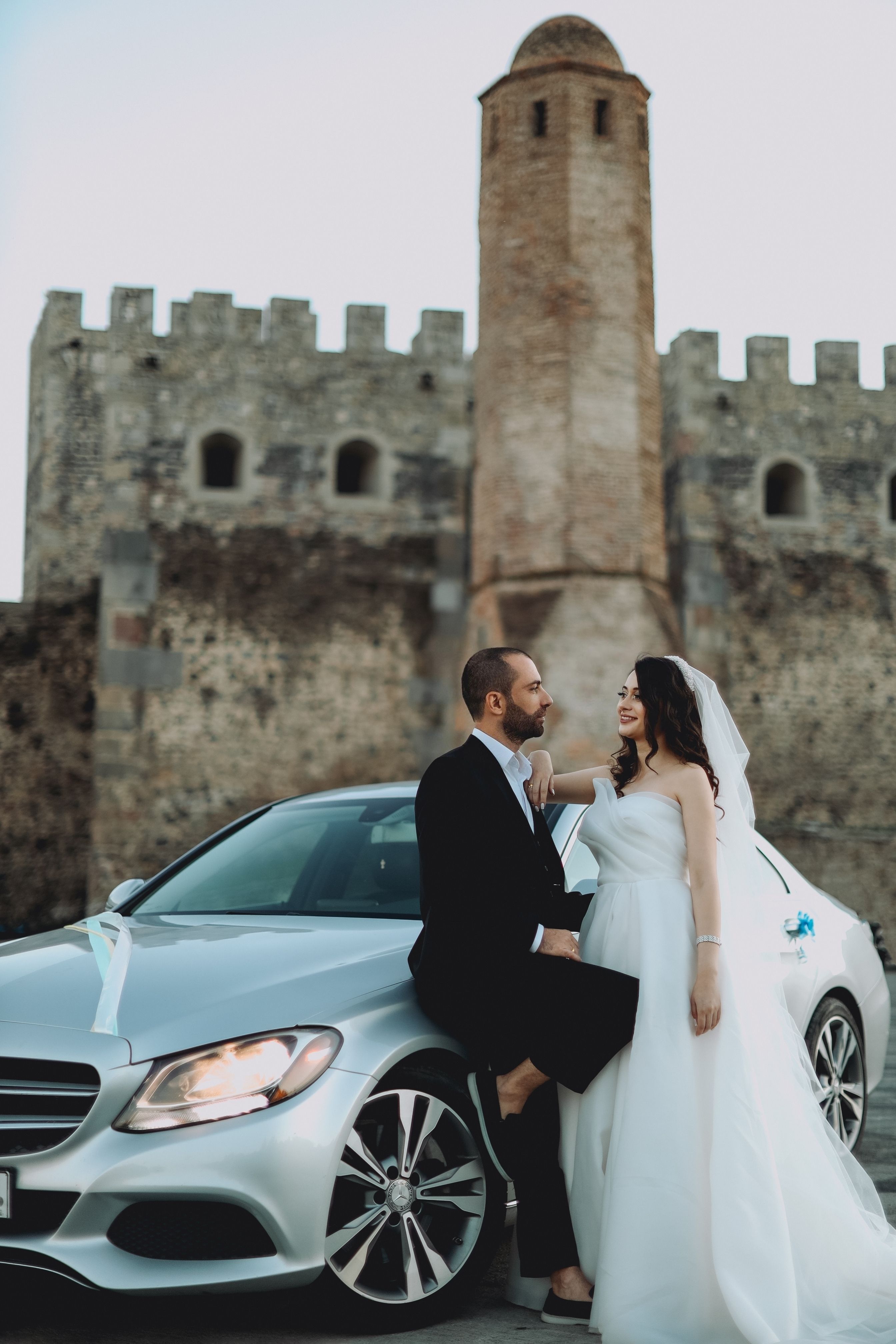 Romantic Wedding Scene at Historic Castle · Free Stock Photo