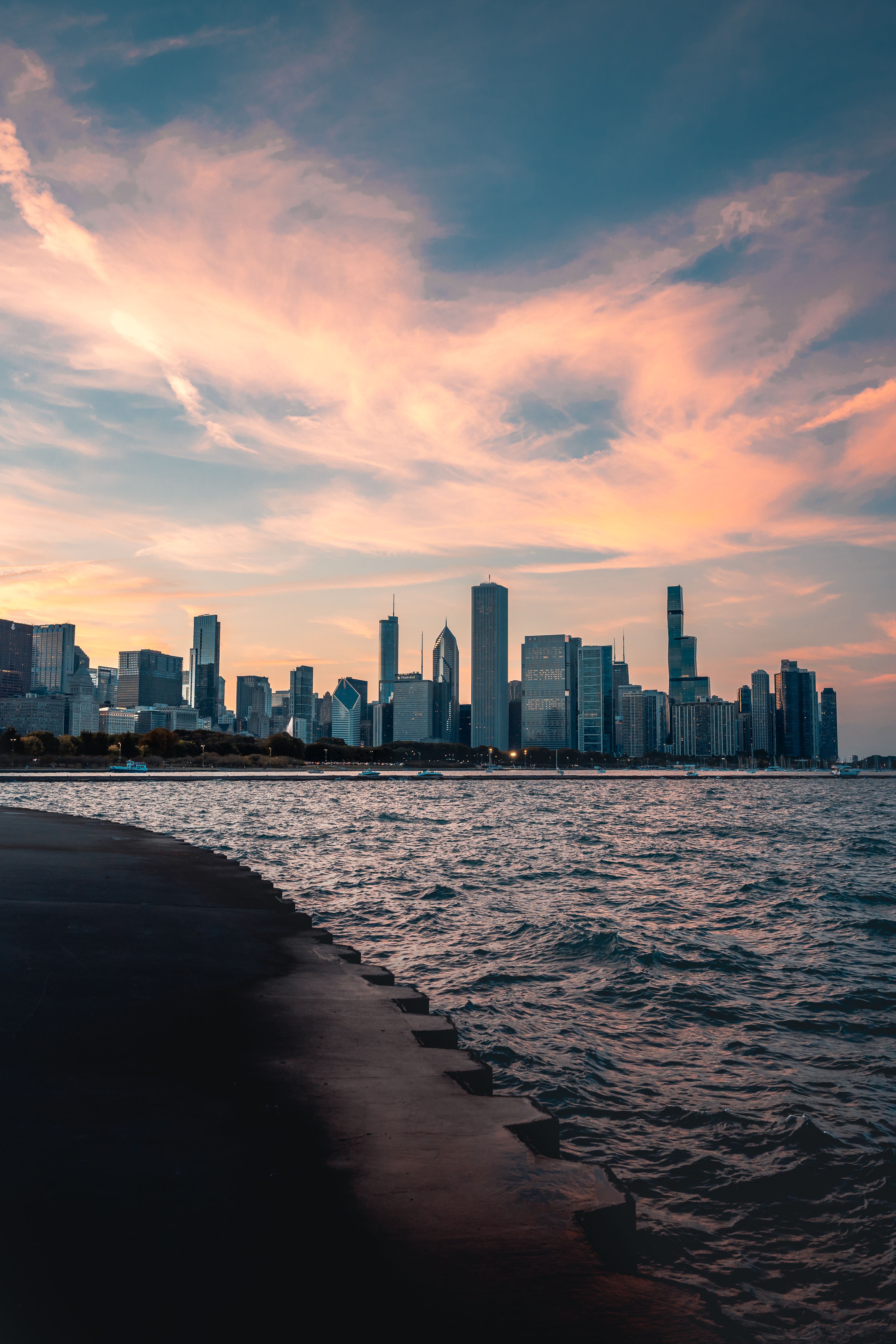Chicago Skyline at Sunset with Calm Waters · Free Stock Photo