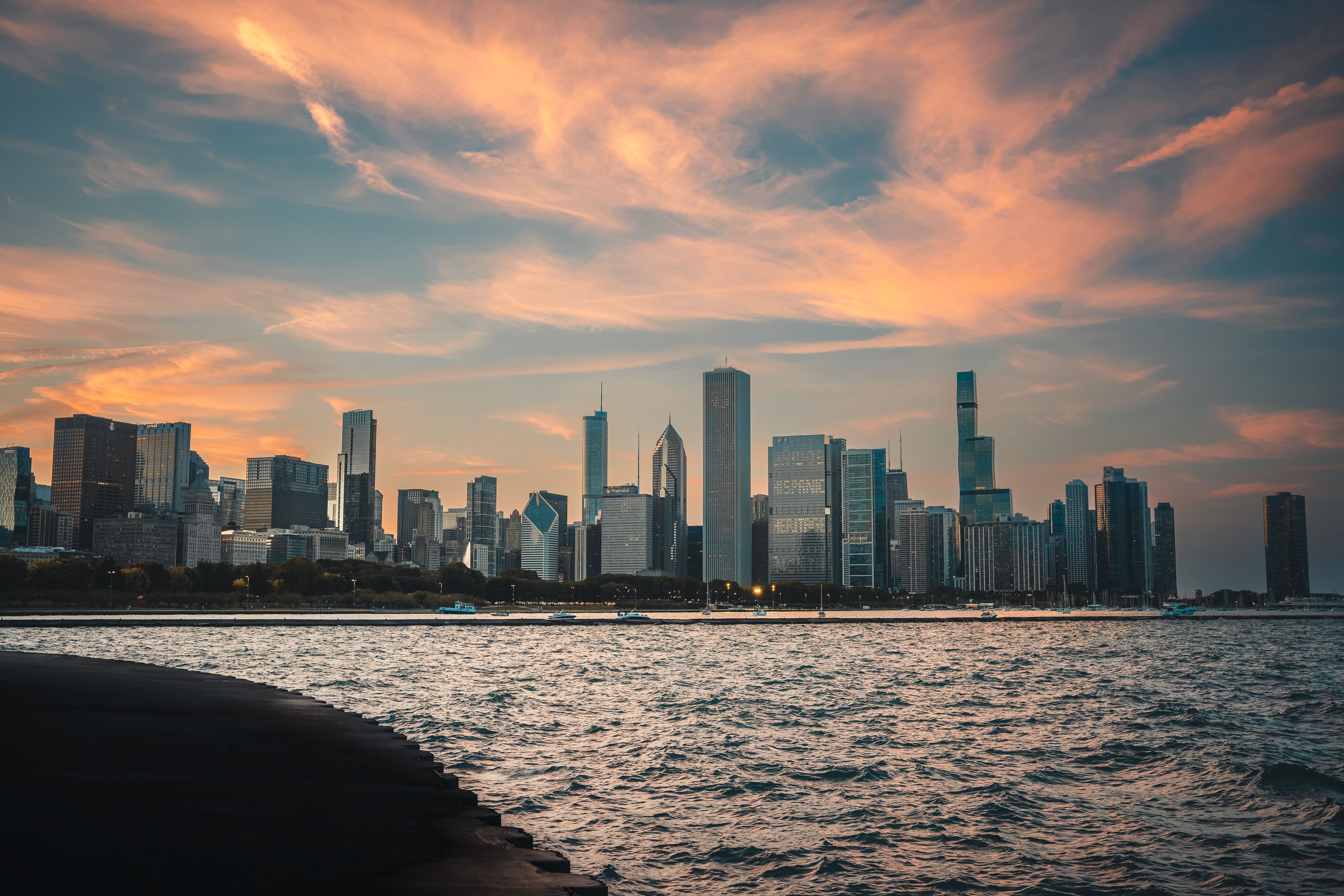 Stunning Chicago Skyline at Sunset Reflecting on Lake · Free Stock Photo