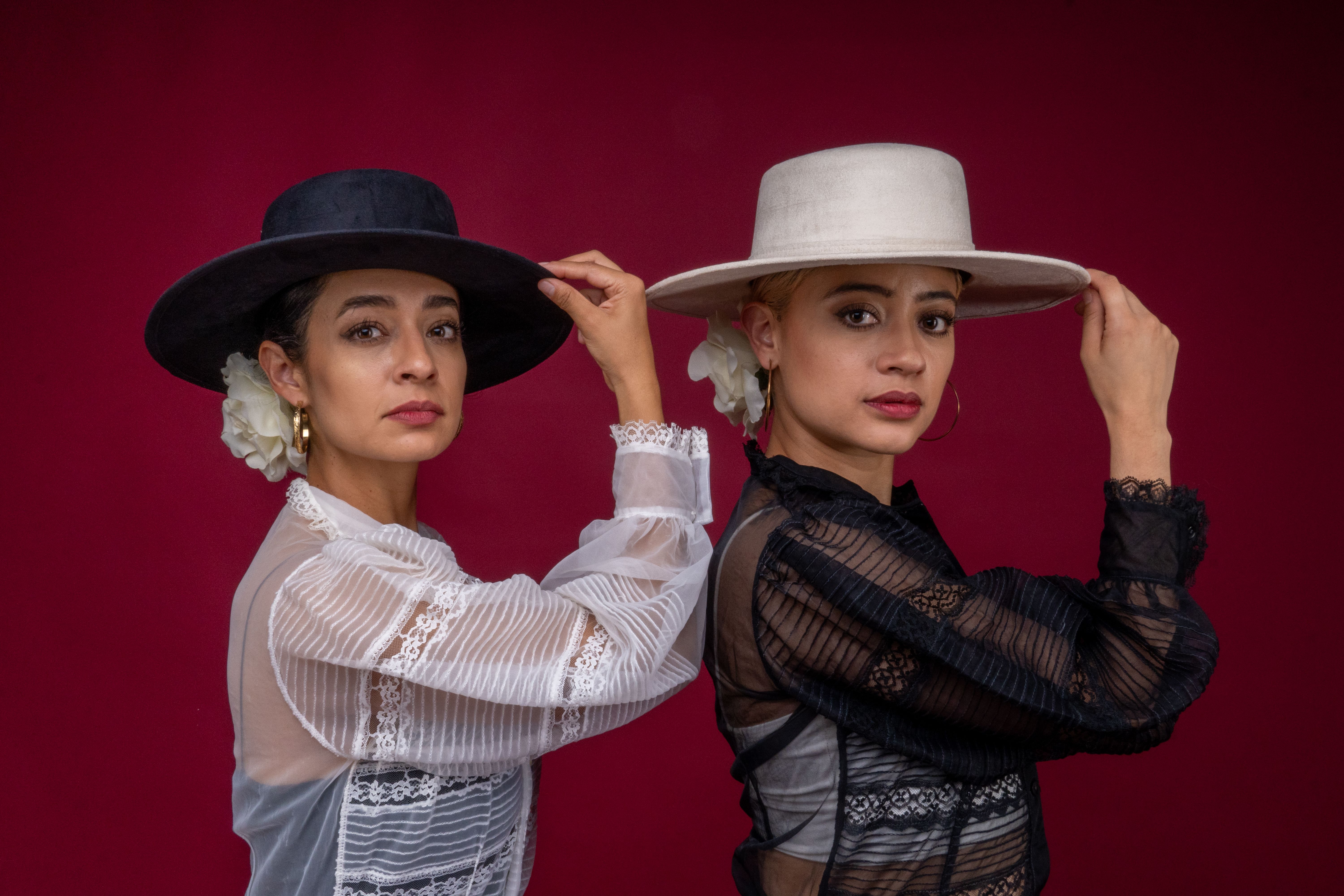 Elegant Flamenco Dancers in Traditional Attire · Free Stock Photo
