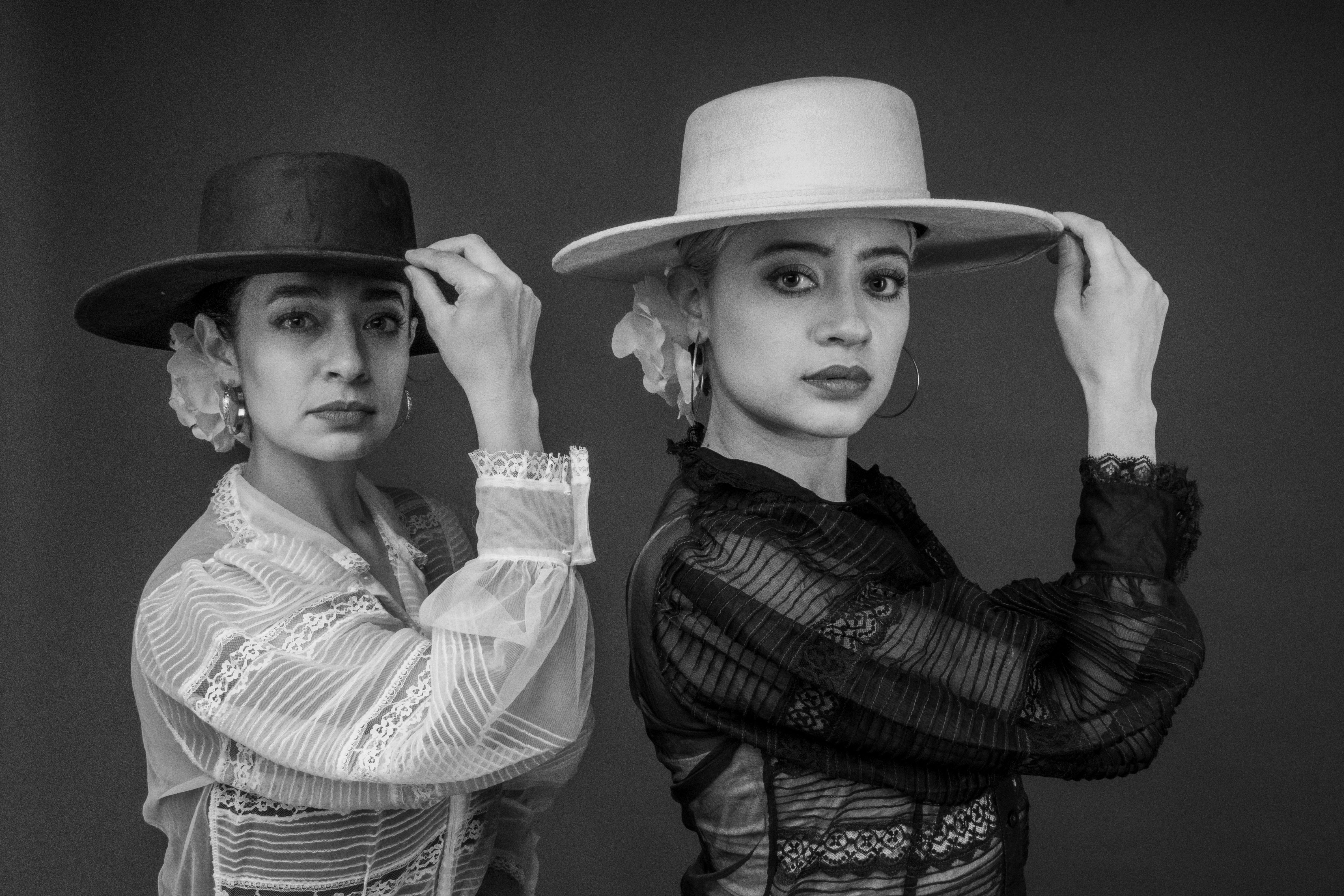 Elegant Flamenco Dancers in Traditional Attire · Free Stock Photo