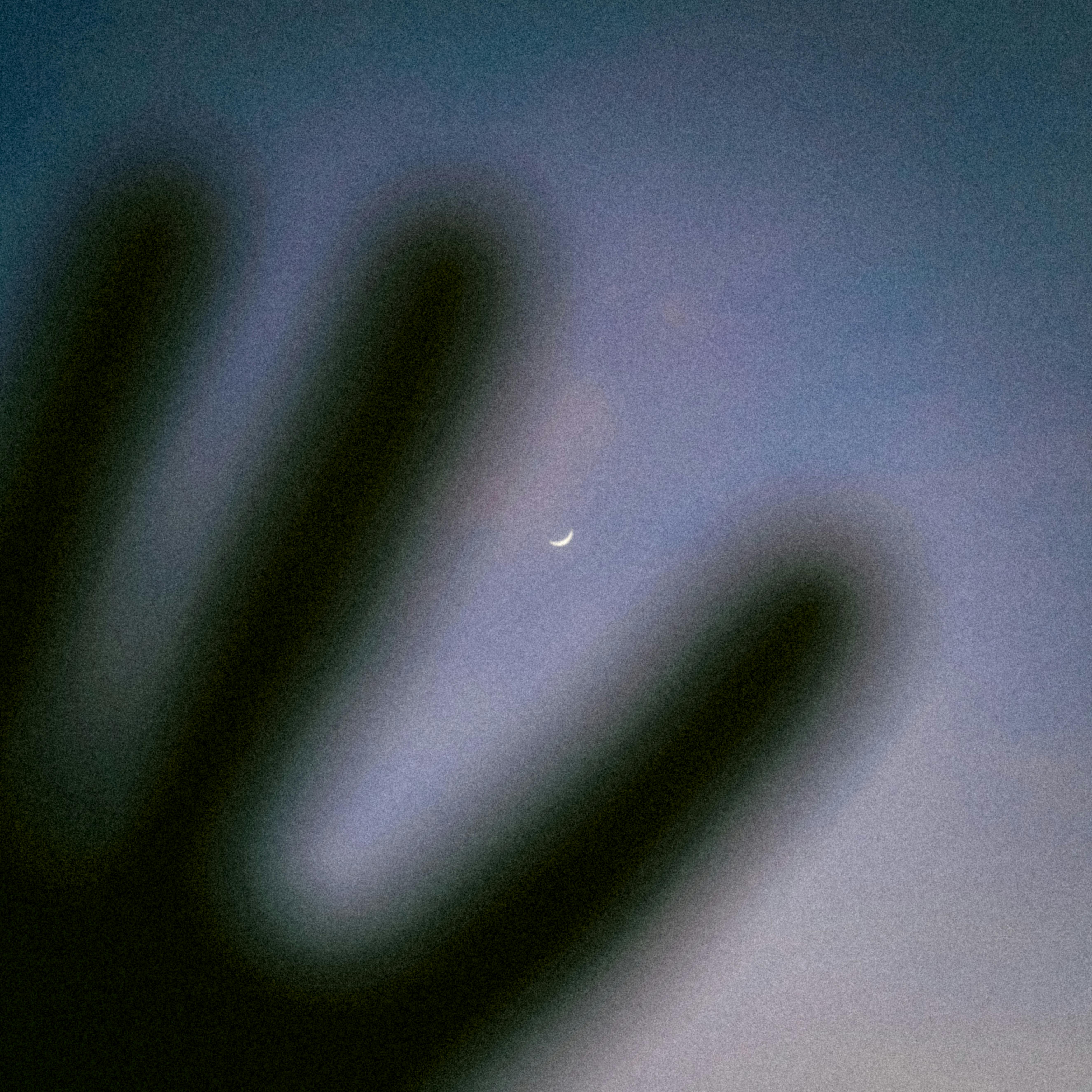 Silhouette of Hand with Crescent Moon in Sky · Free Stock Photo