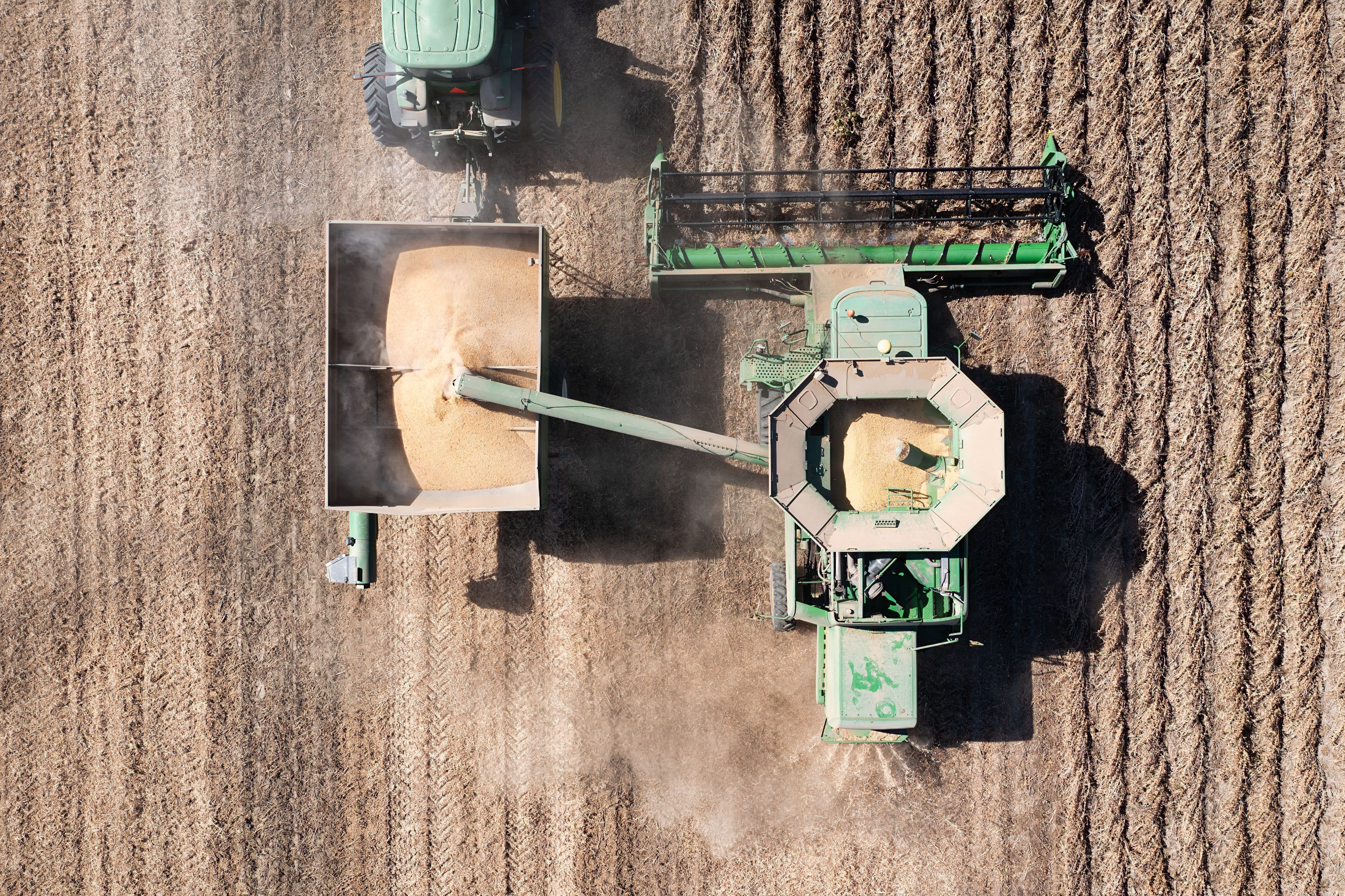 Aerial View of Combine Harvesting in Field · Free Stock Photo