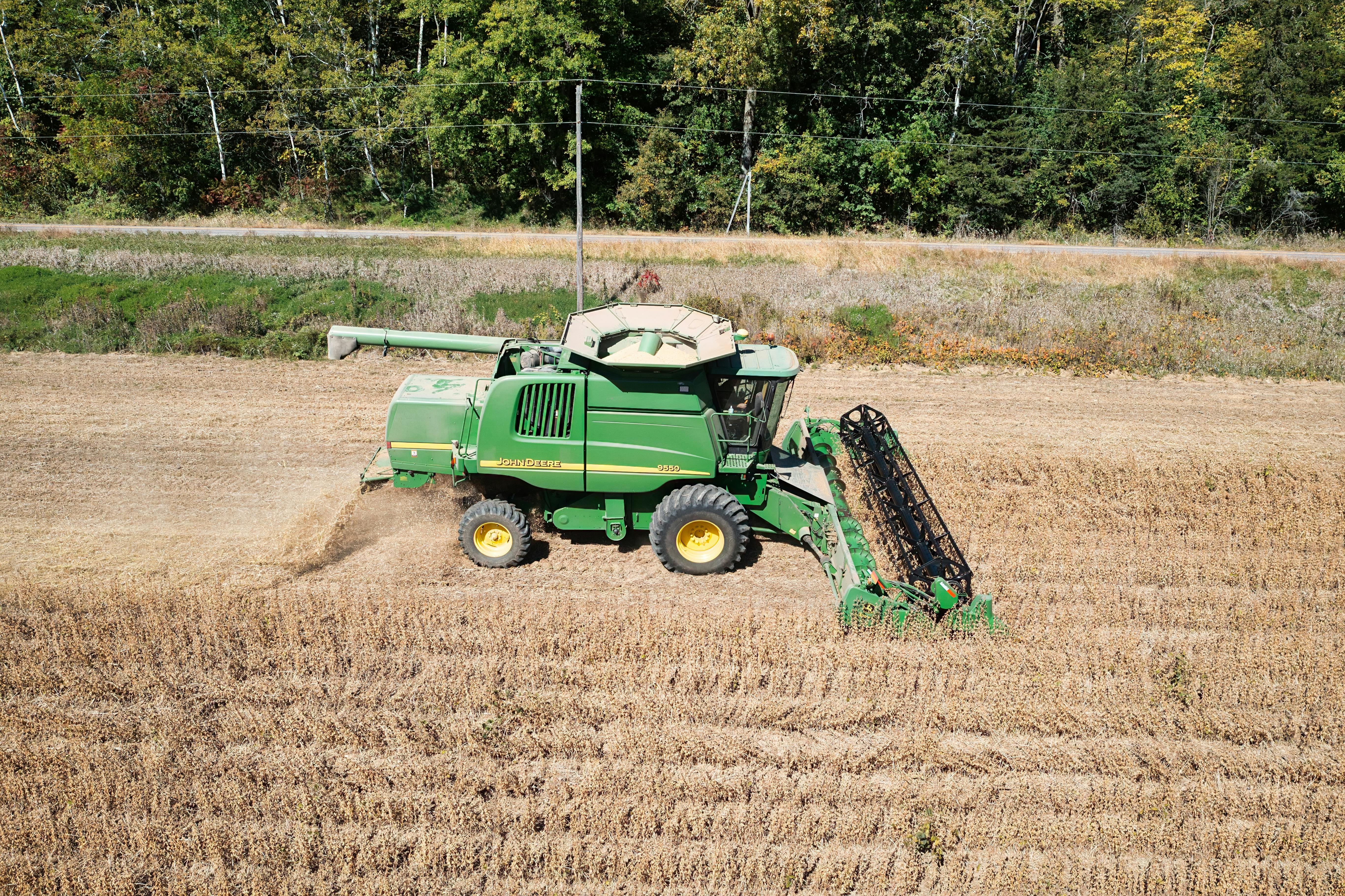 Aerial View of Harvester on Wheat Field in Minnesota · Free Stock Photo
