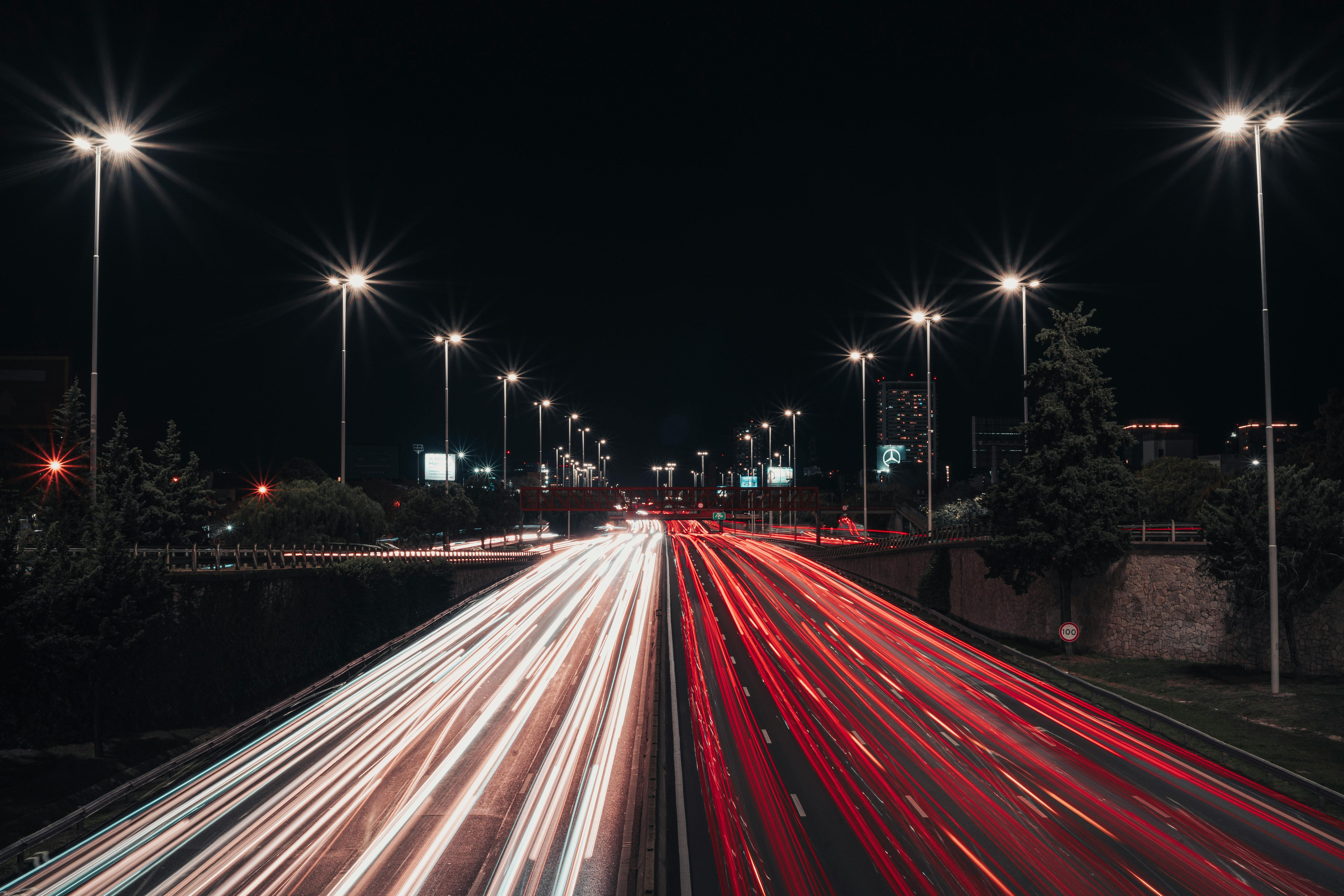 Nighttime Traffic Long Exposure on City Highway · Free Stock Photo