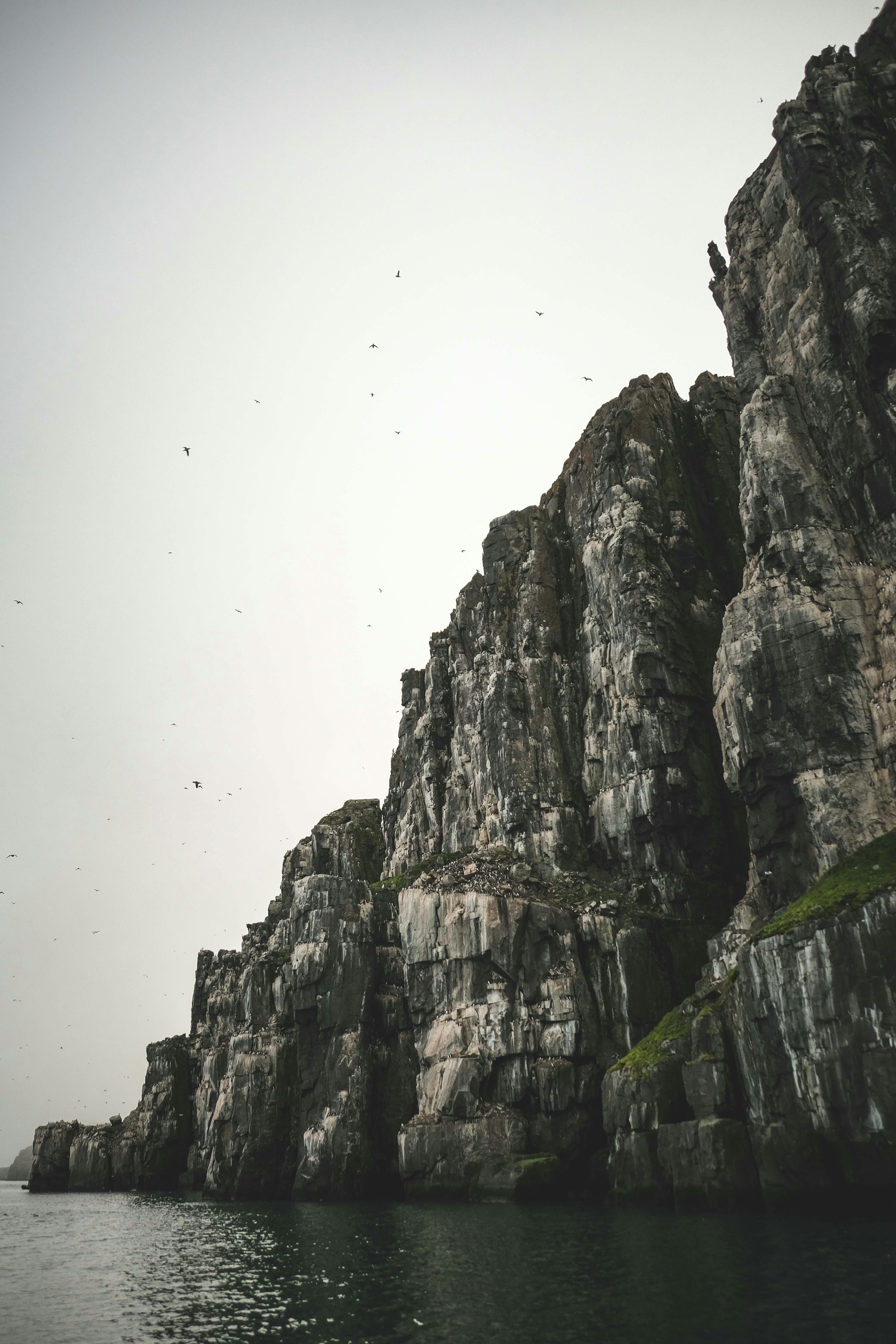 Dramatic Rocky Cliffside by the Ocean · Free Stock Photo