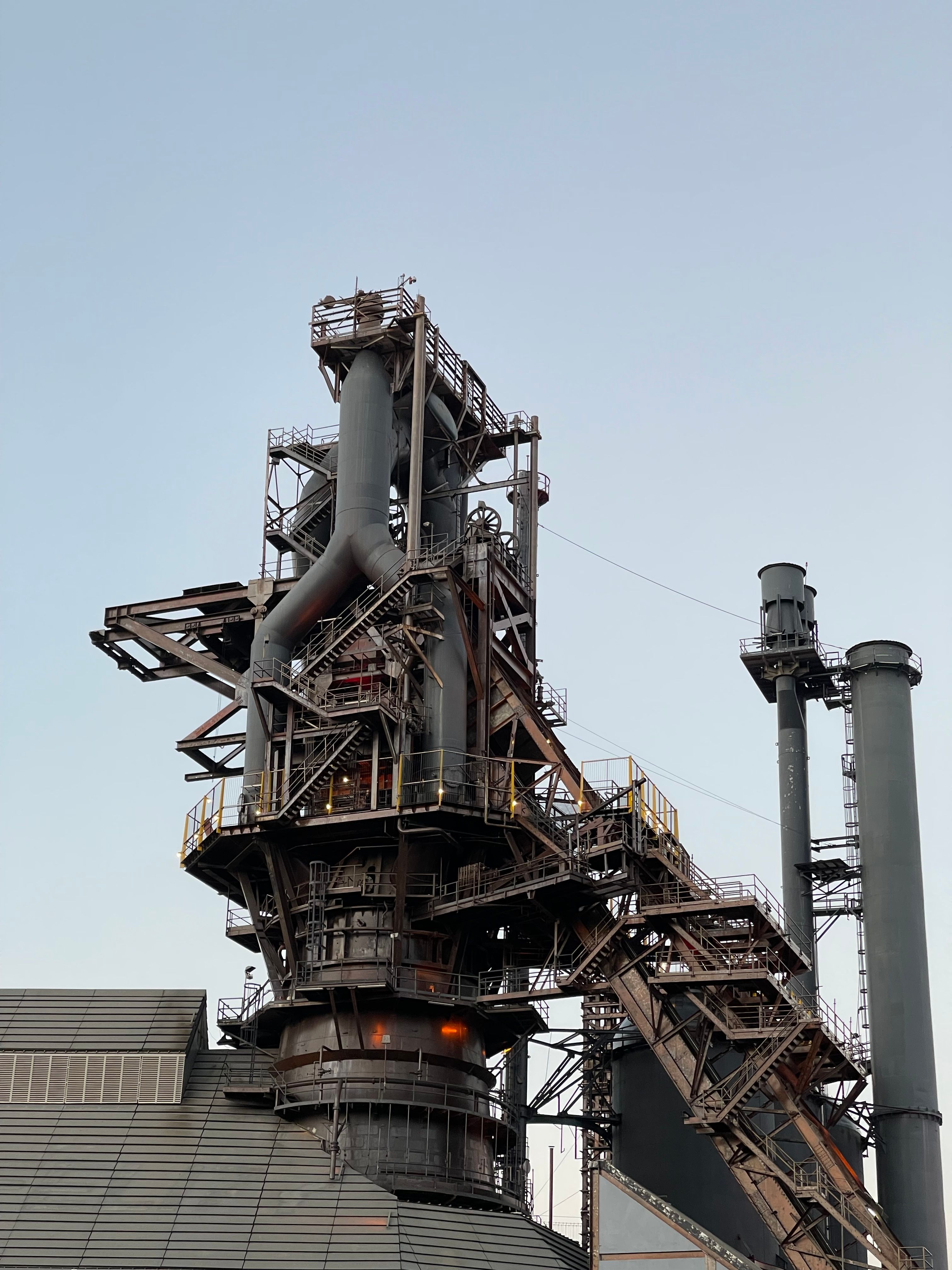 Industrial Steel Structure Against Clear Sky · Free Stock Photo