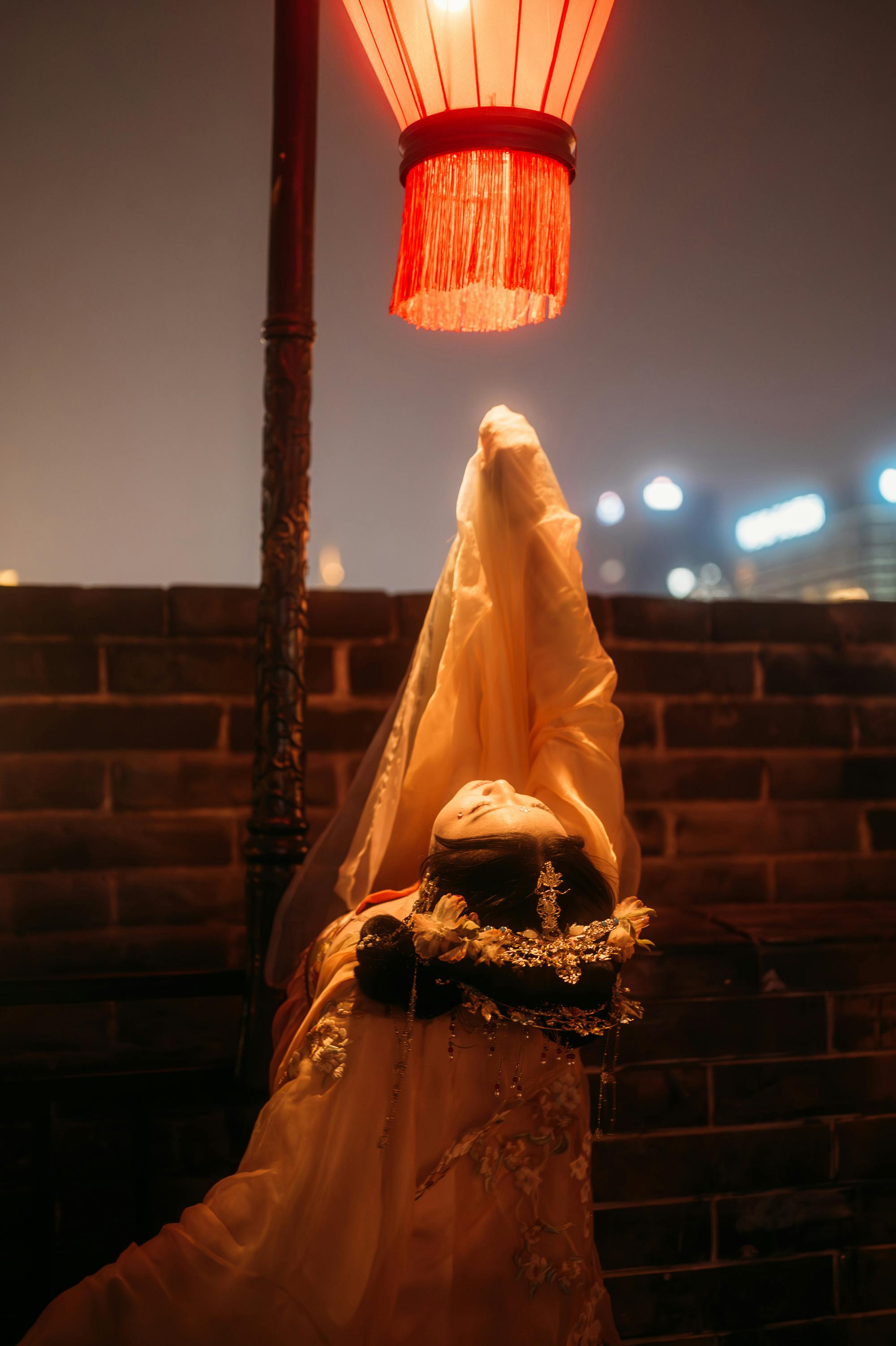 Elegant Traditional Dance Under Lantern Light · Free Stock Photo