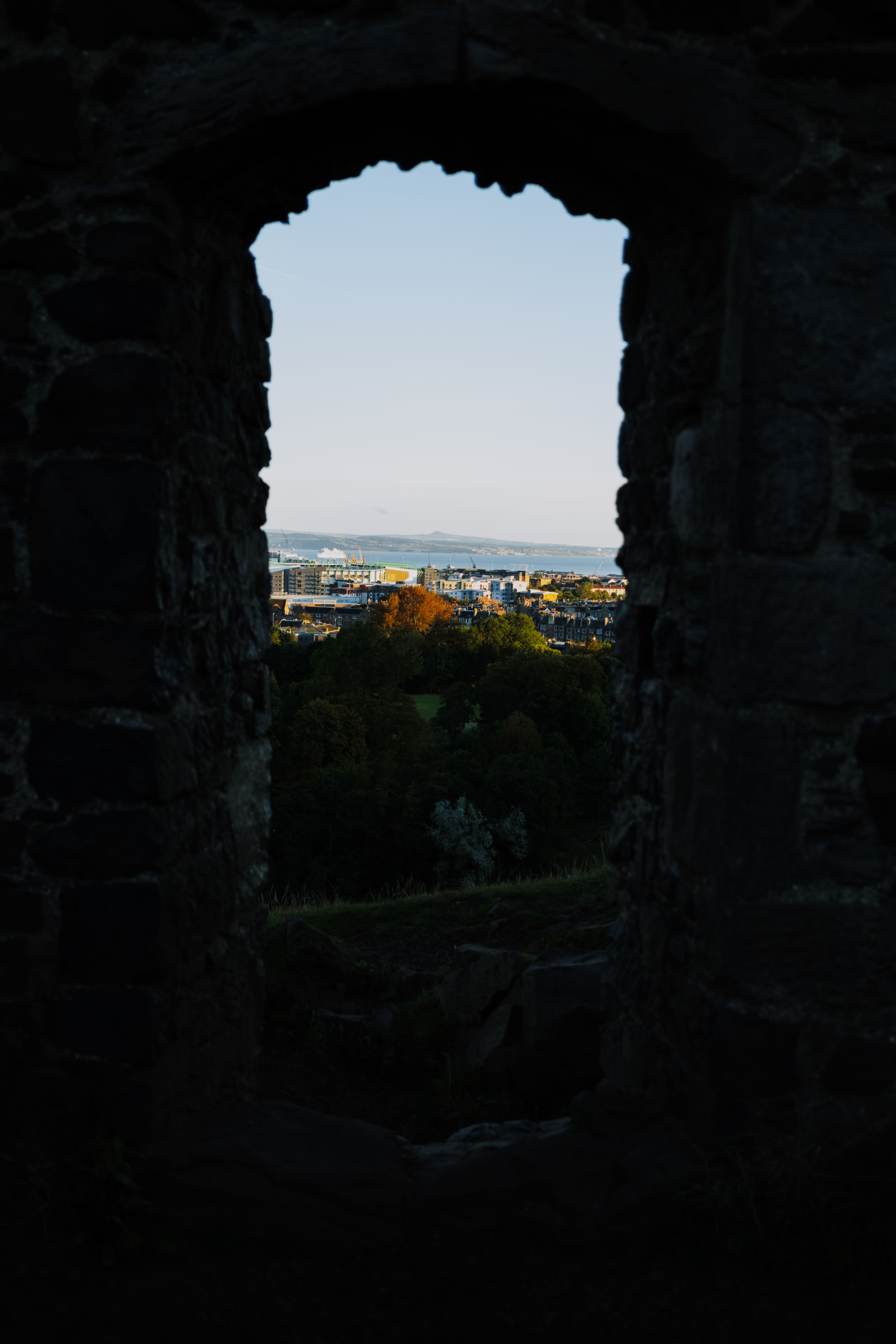 Scenic View Through Ancient Castle Window · Free Stock Photo