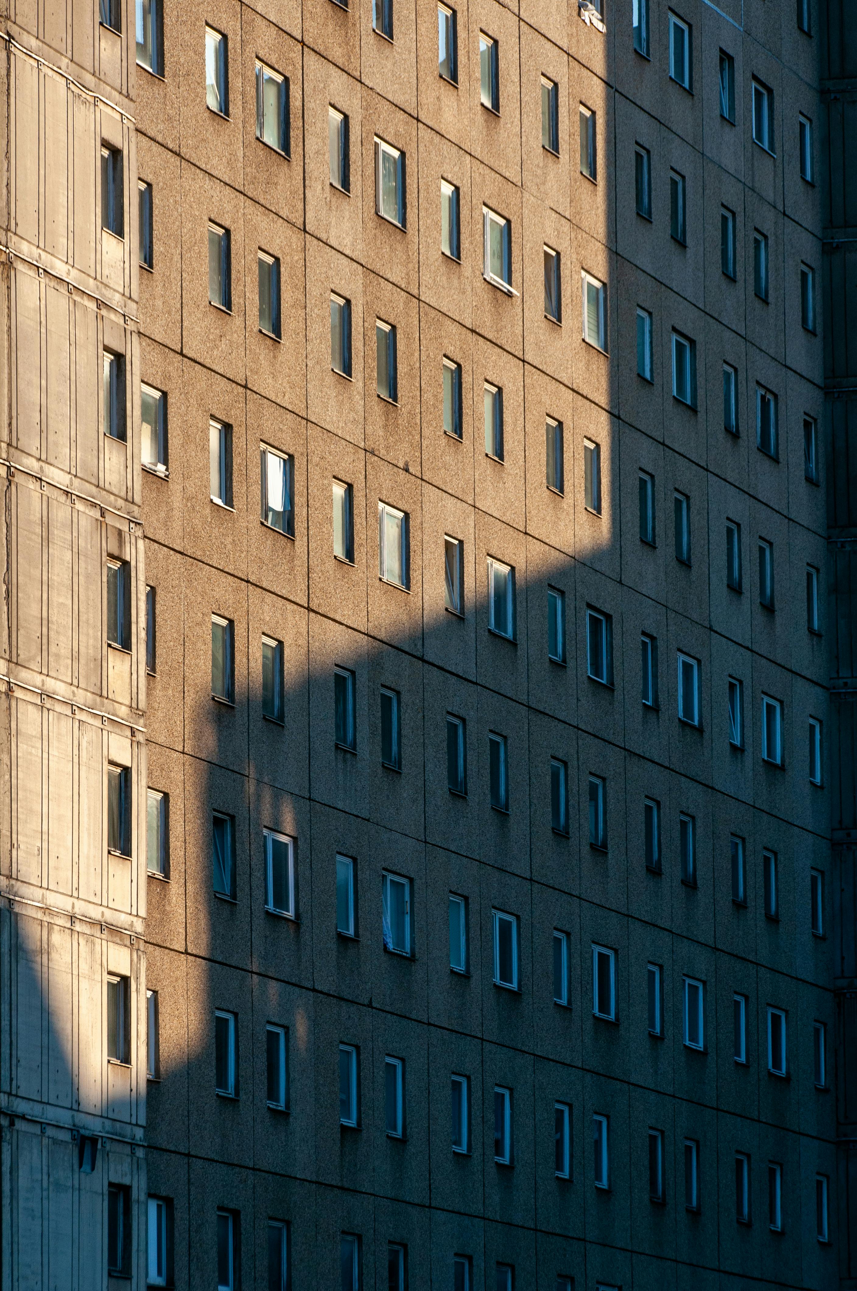 Modern Building with Geometric Shadows · Free Stock Photo