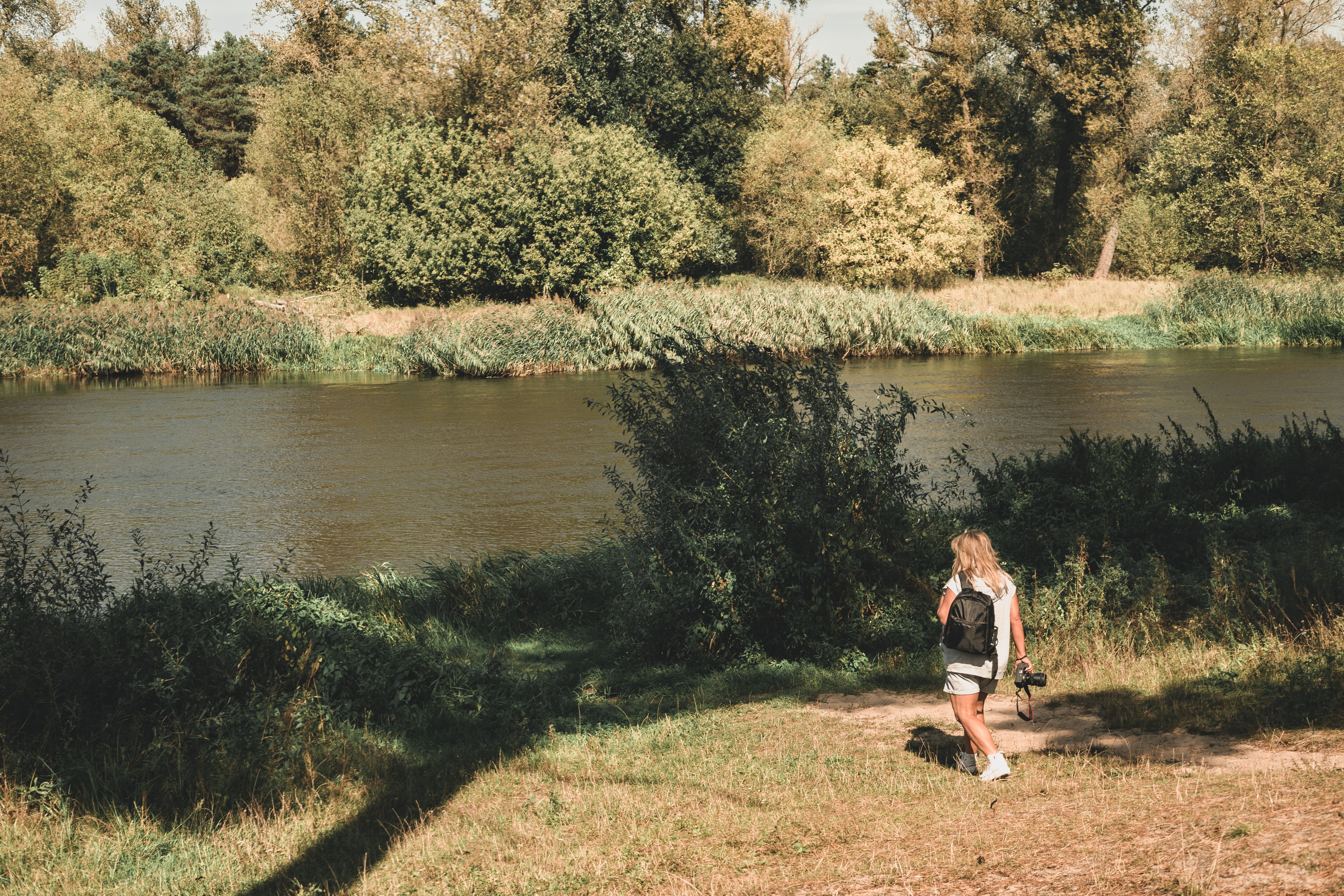 Nature Photographer by River in Poland · Free Stock Photo