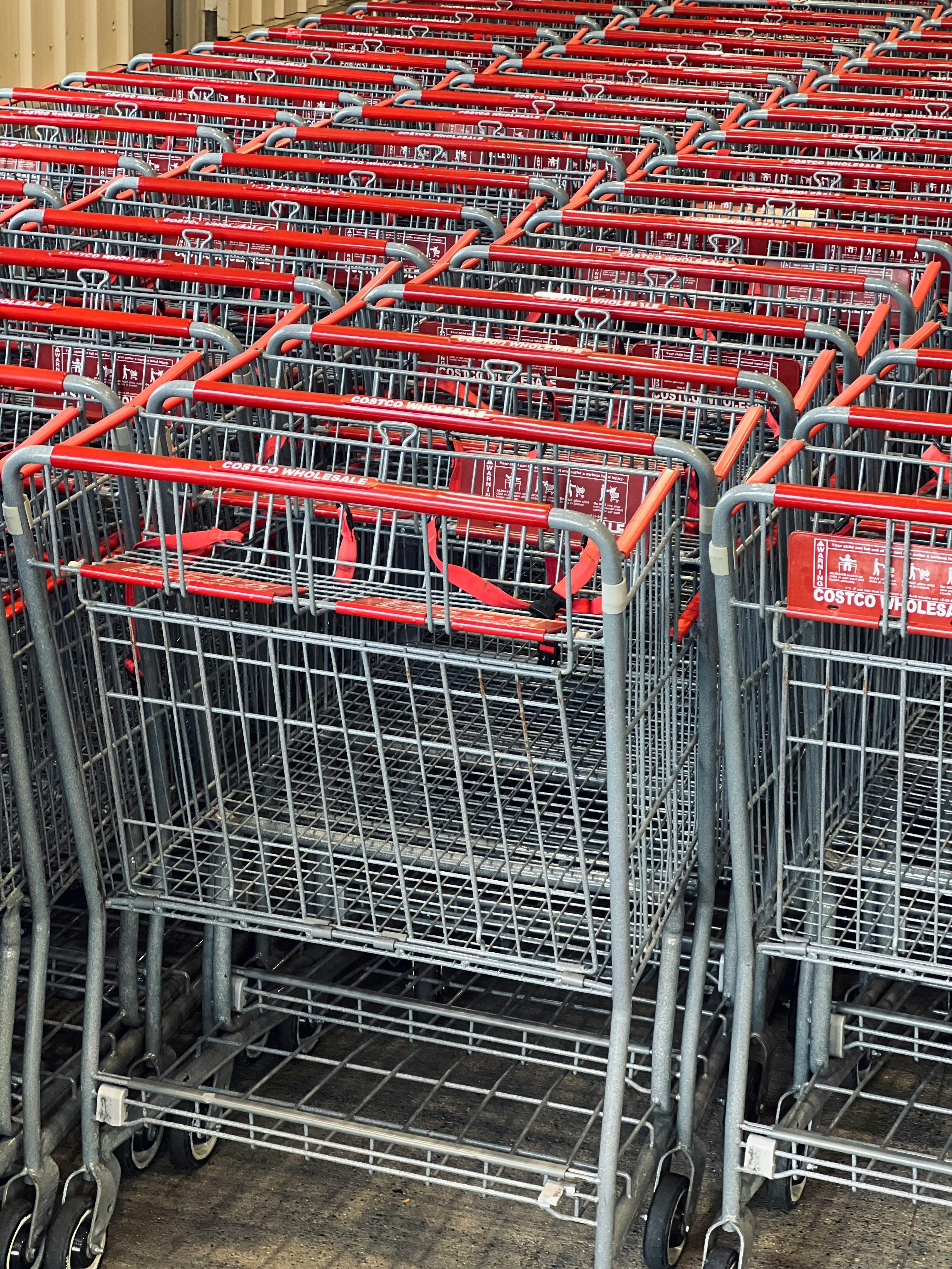 Stacked Shopping Carts at Retail Store Entrance · Free Stock Photo