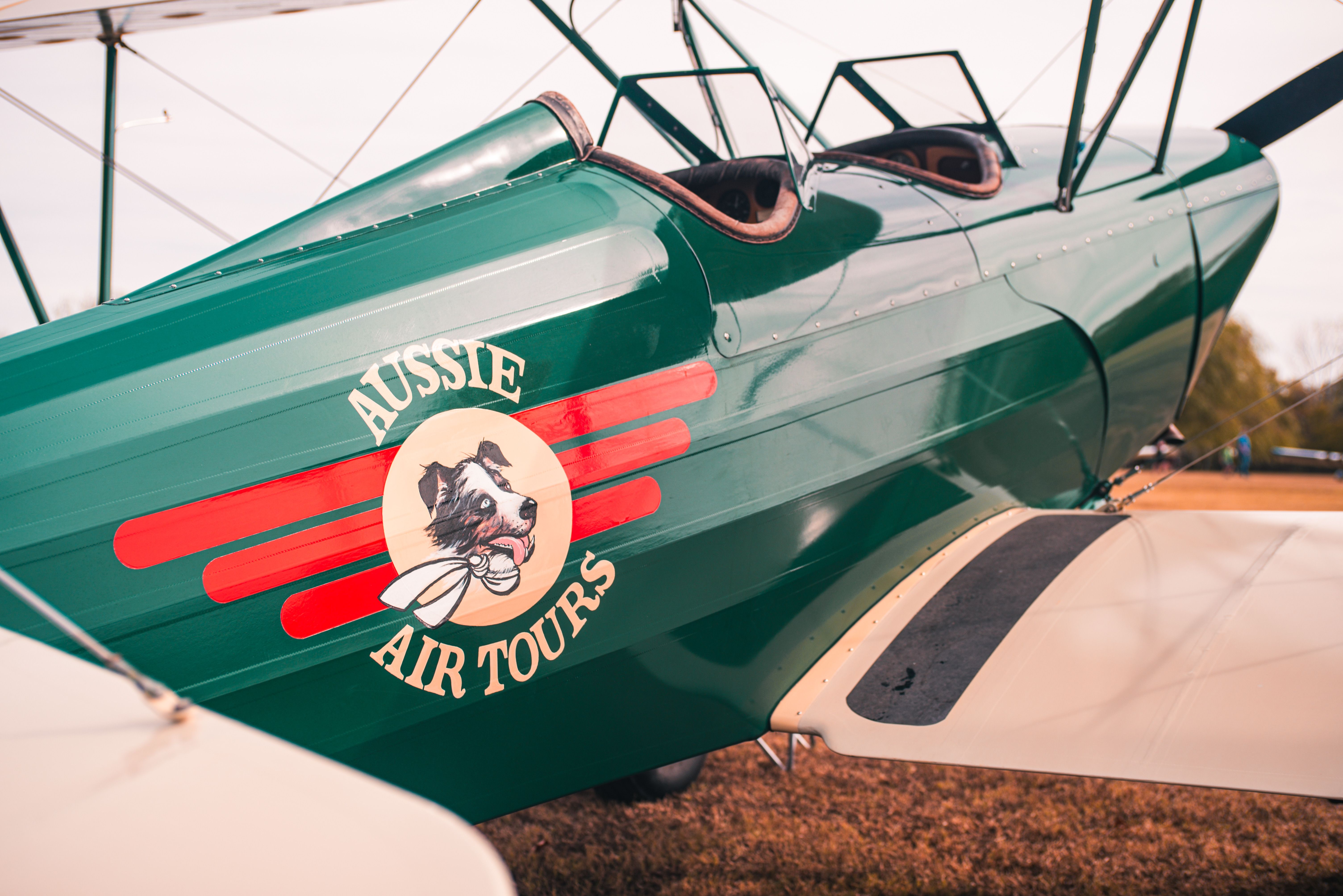 Vintage Aircraft with Aussie Air Tours Logo · Free Stock Photo