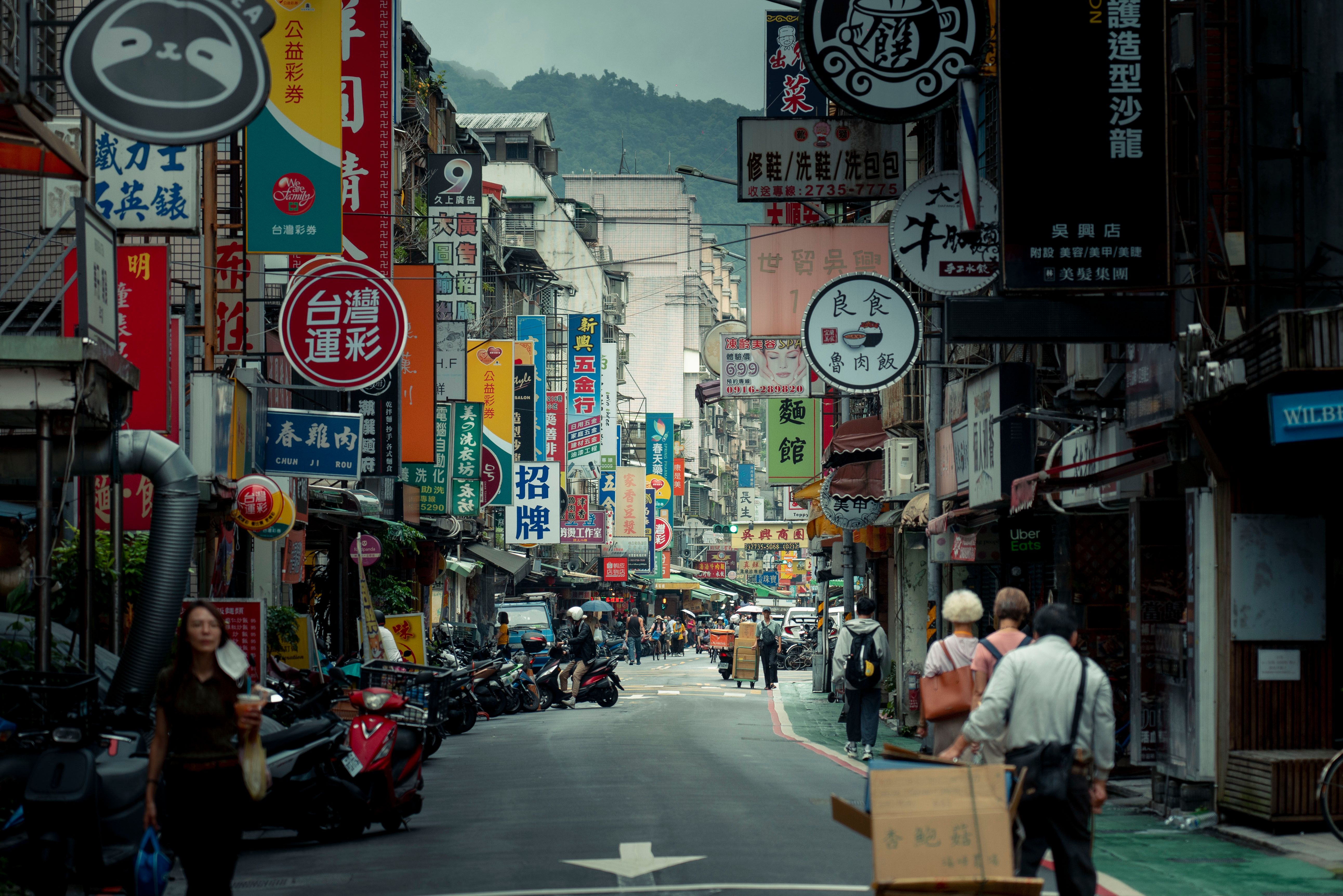 Vibrant Taipei Street with Colorful Signs · Free Stock Photo
