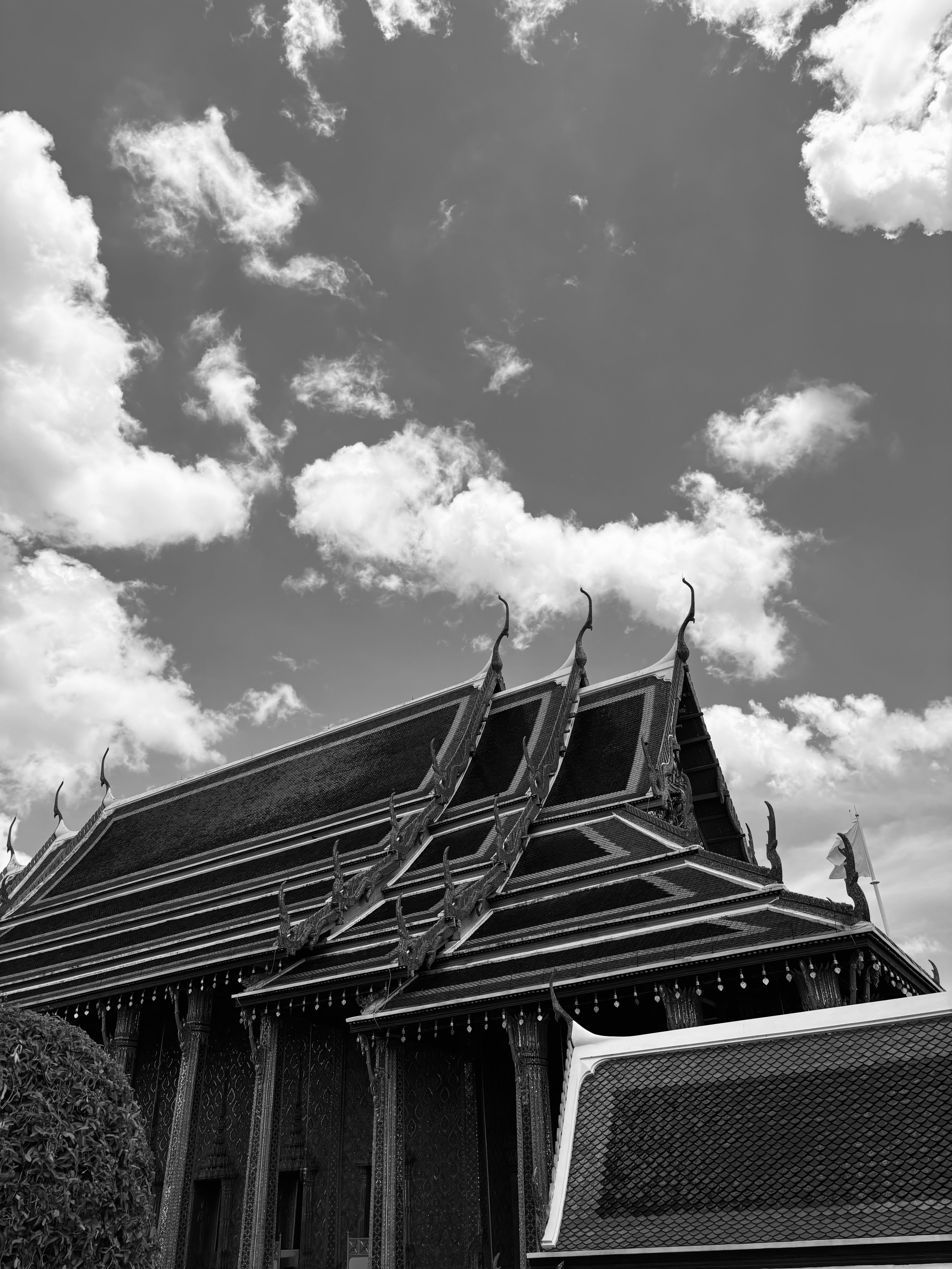 Traditional Thai Architecture Under Cloudy Sky · Free Stock Photo