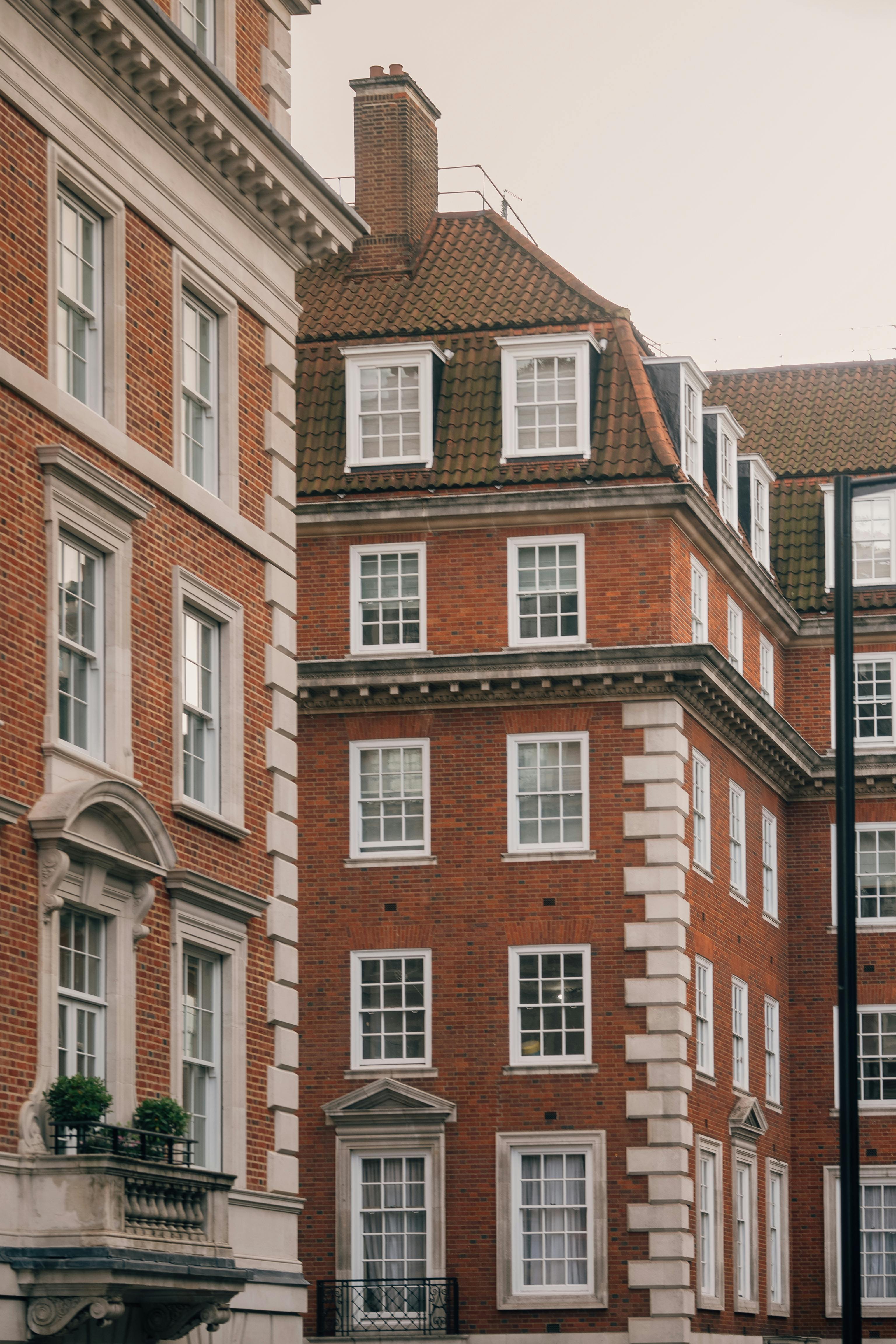 Elegant Brick Architecture in Historic Cityscape · Free Stock Photo