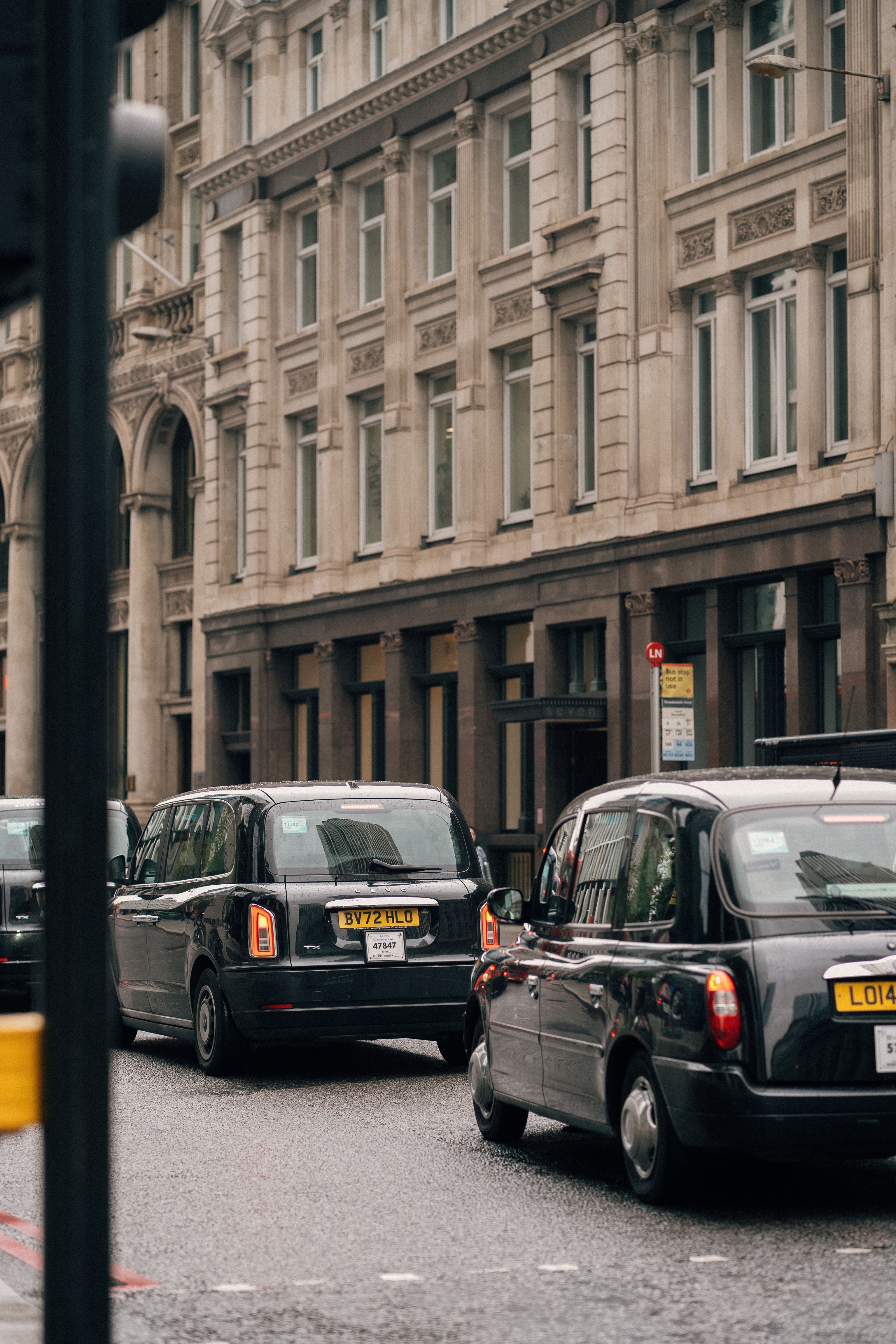 Classic London Taxi Cabs on Historic City Street · Free Stock Photo