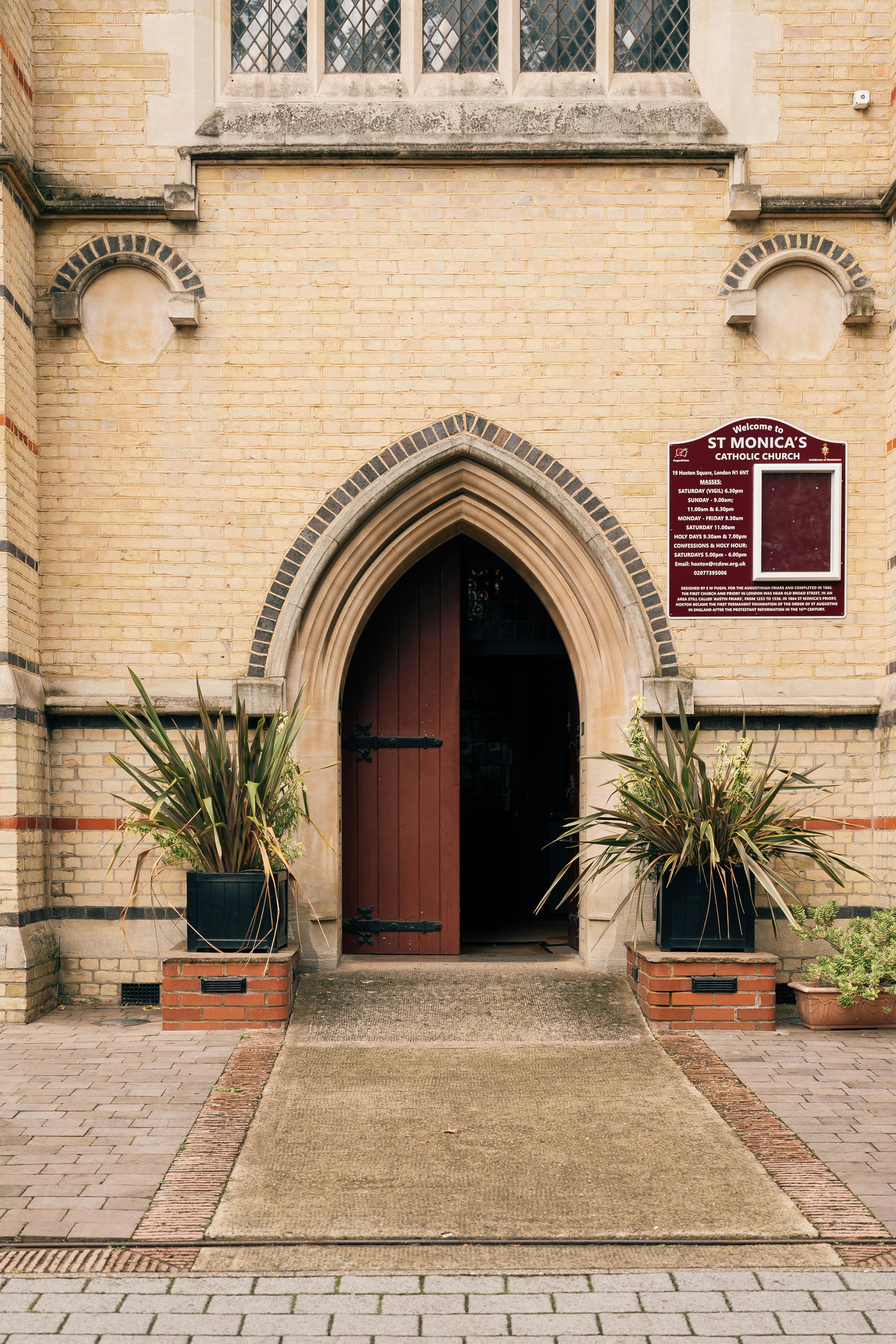 Historic Church Entrance with Gothic Archway · Free Stock Photo