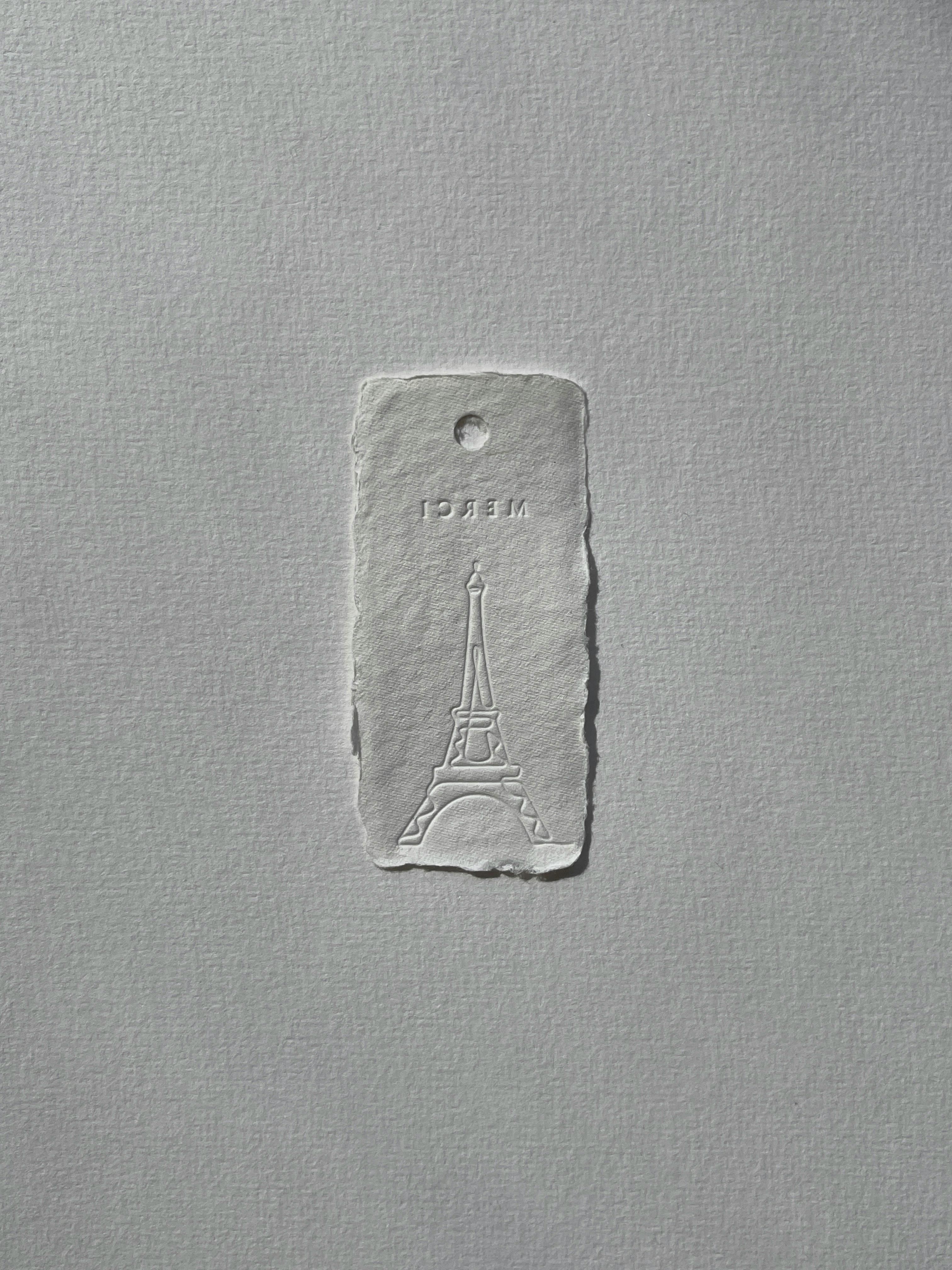 Minimalist Eiffel Tower Embossed Tag Art · Free Stock Photo