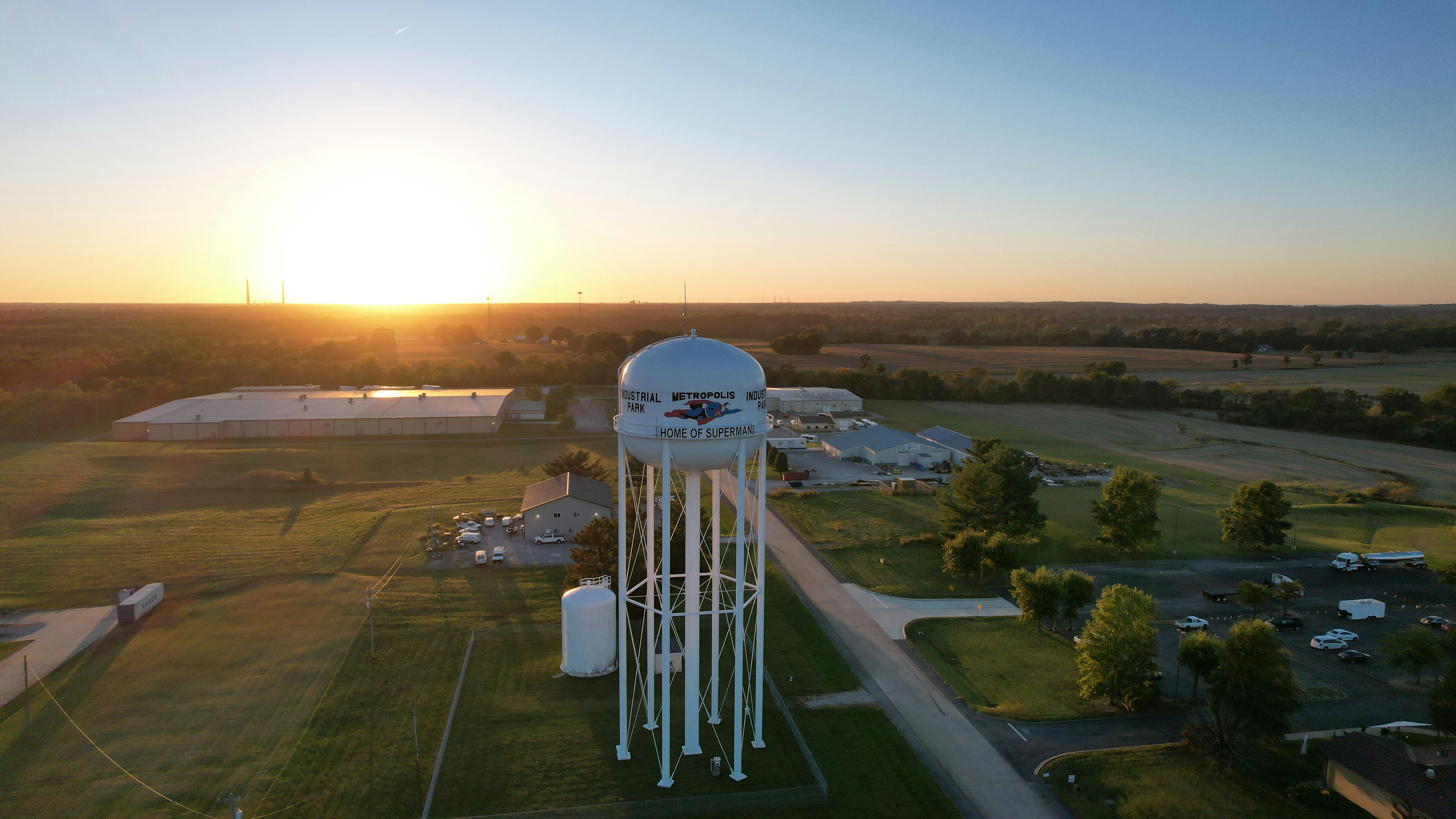 Metropolis IL Water Tower at Sunset Aerial View · Free Stock Photo