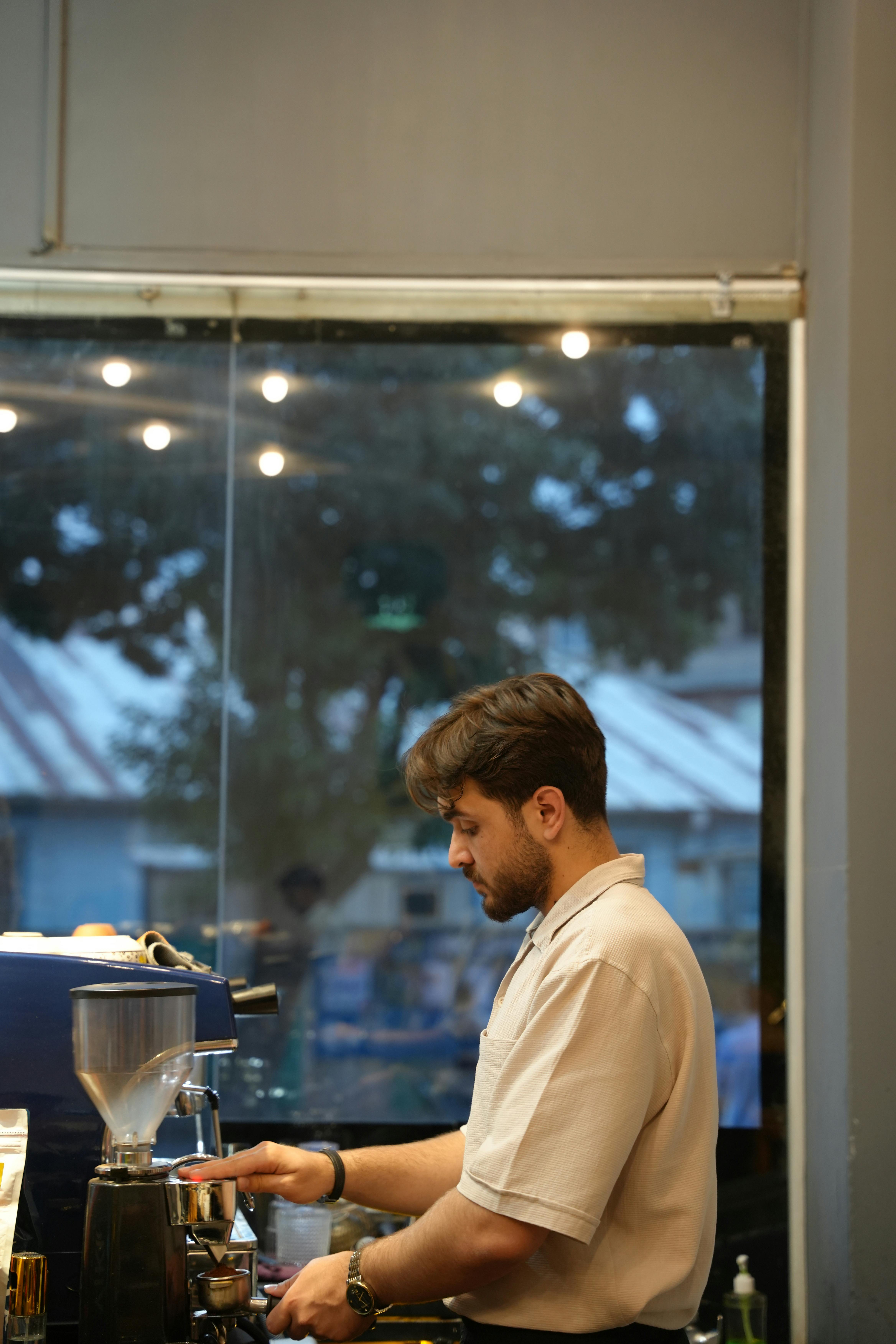 Chef Holding White Tea Cup · Free Stock Photo