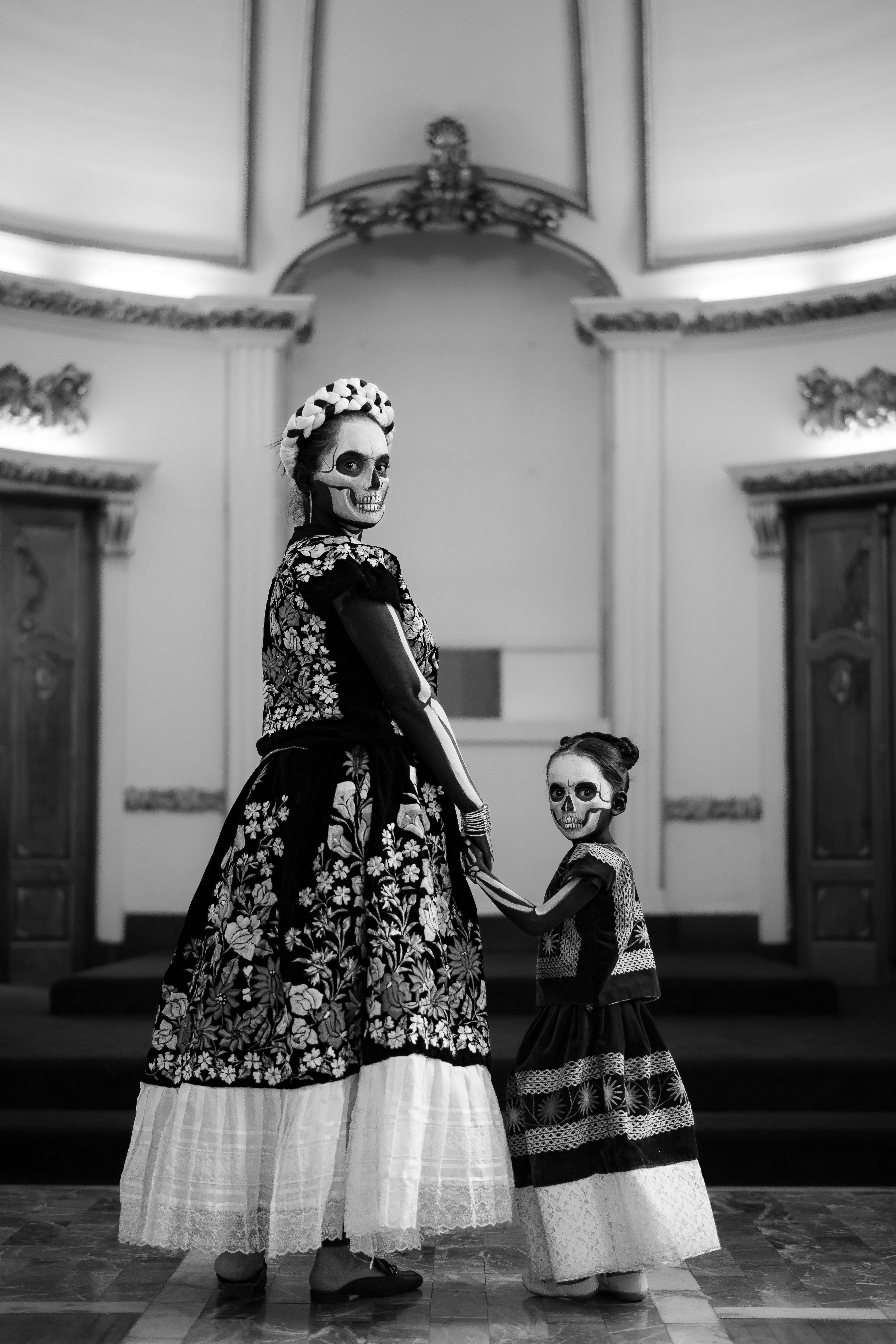 Mother and Child in Catrina Costumes in Mexico City · Free Stock Photo
