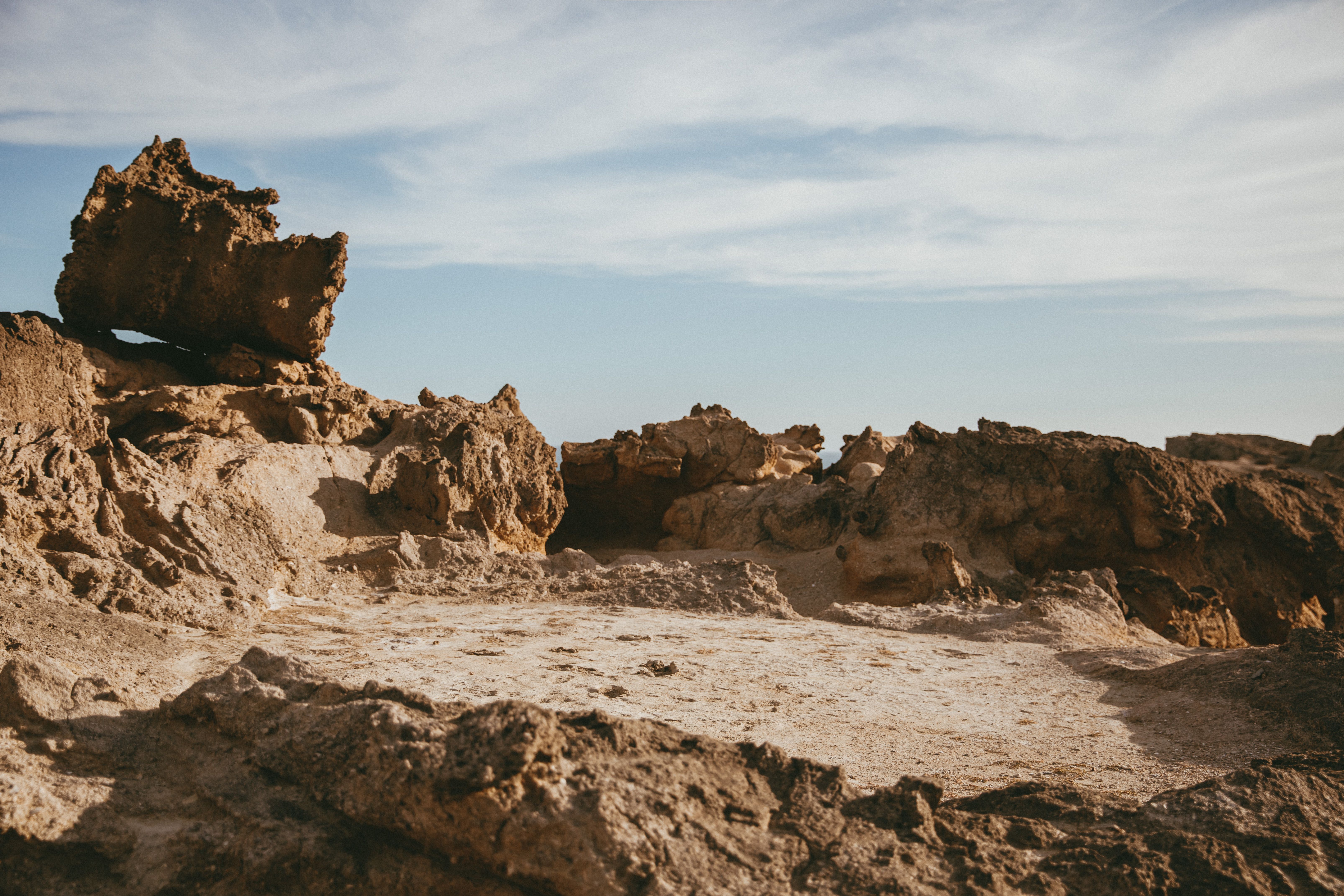 Rocky Coastal Landscape under Clear Sky · Free Stock Photo