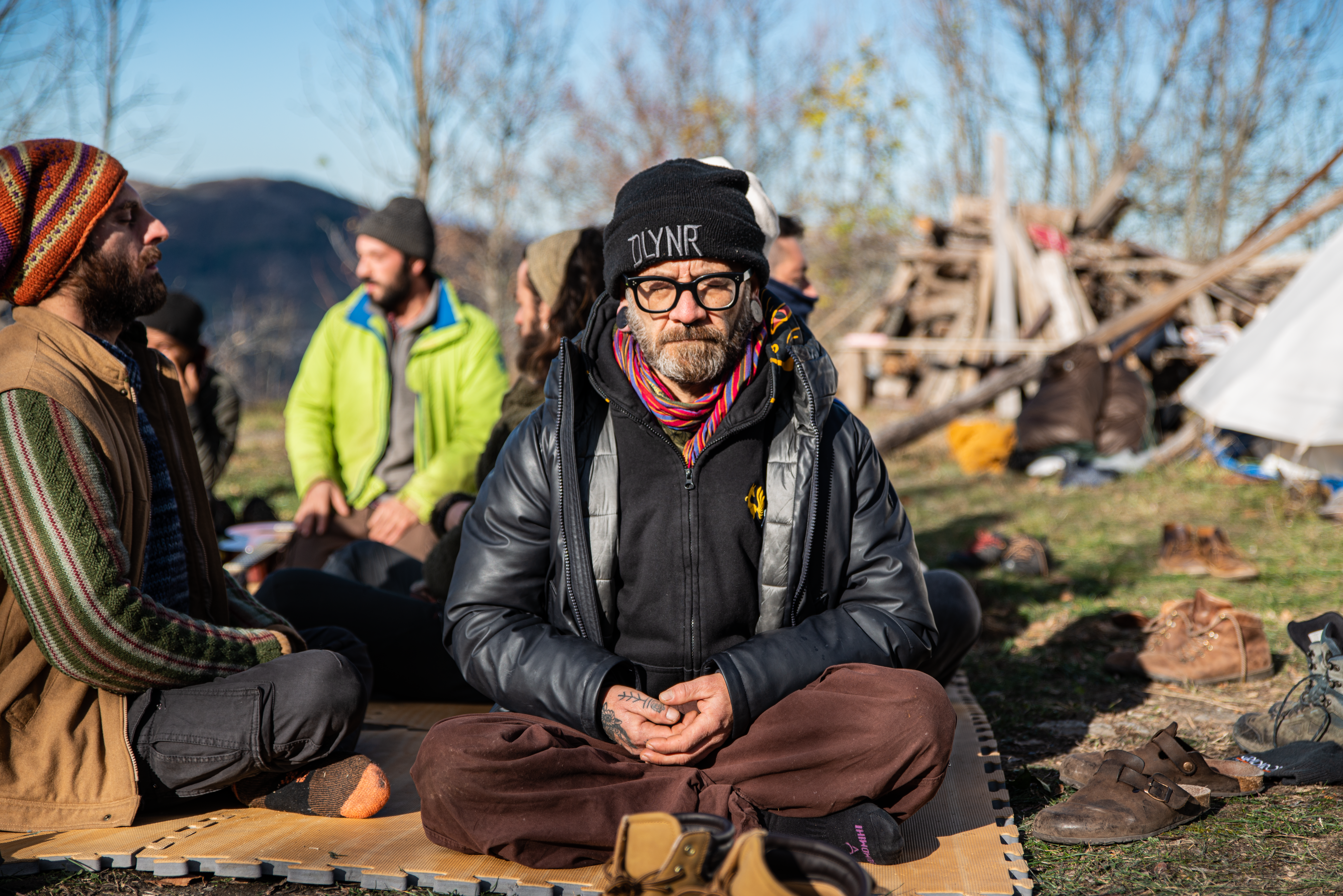 Outdoor Group Meditation in Nature Retreat Setting · Free Stock Photo