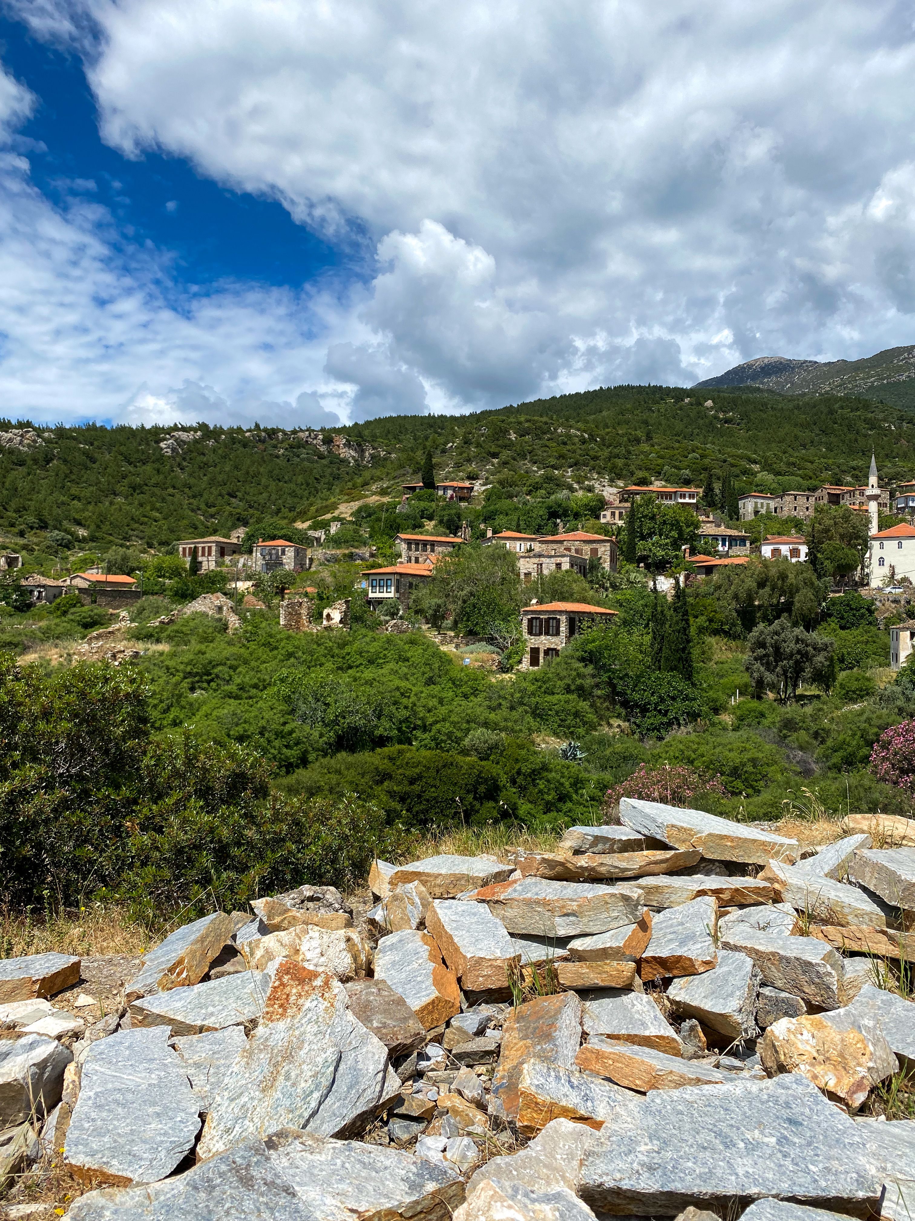 Scenic Hilltop Village in Lush Green Valley · Free Stock Photo