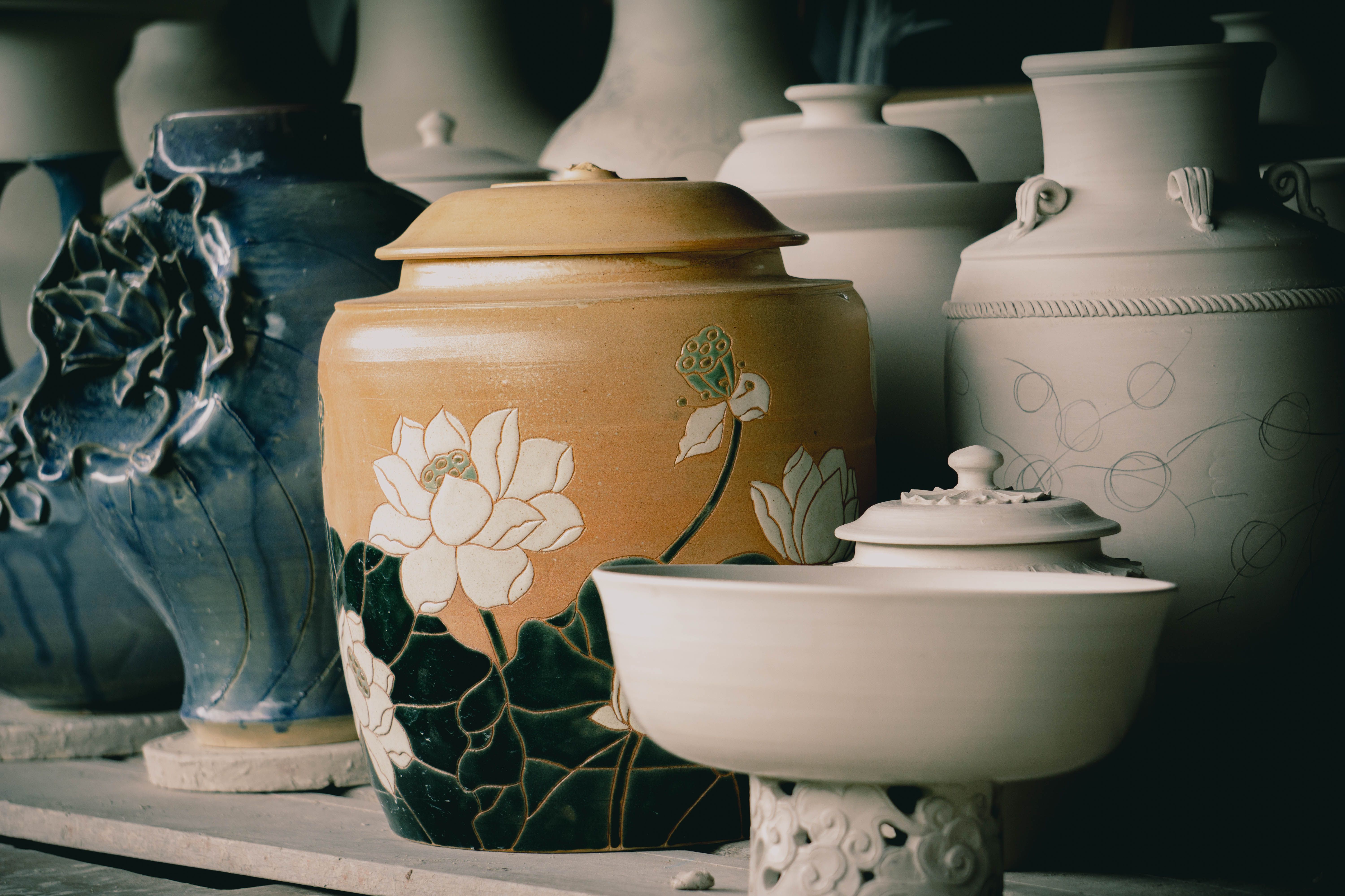 Handcrafted Ceramic Vases with Floral Designs · Free Stock Photo