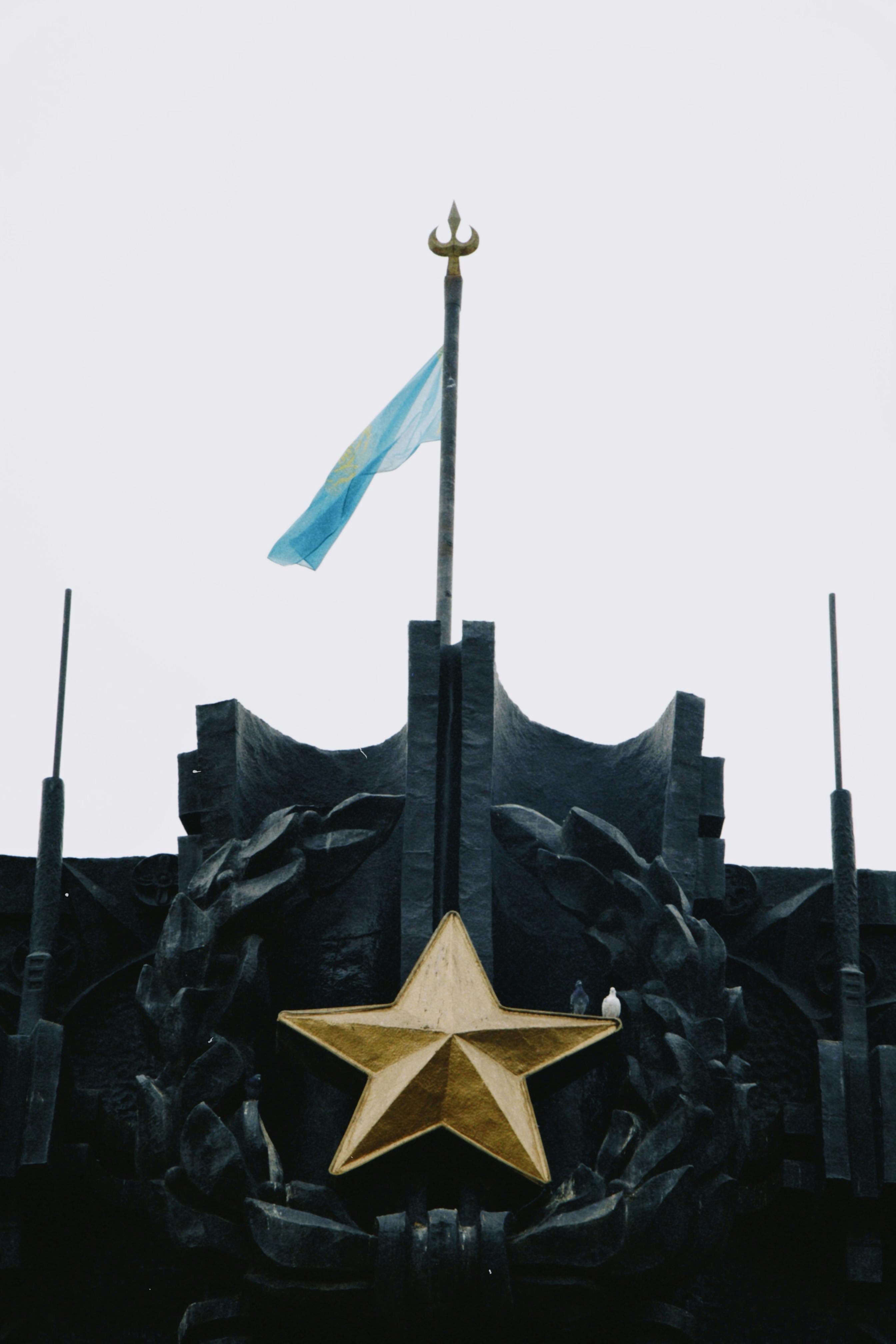 Kazakhstan Emblem with National Flag in Almaty · Free Stock Photo