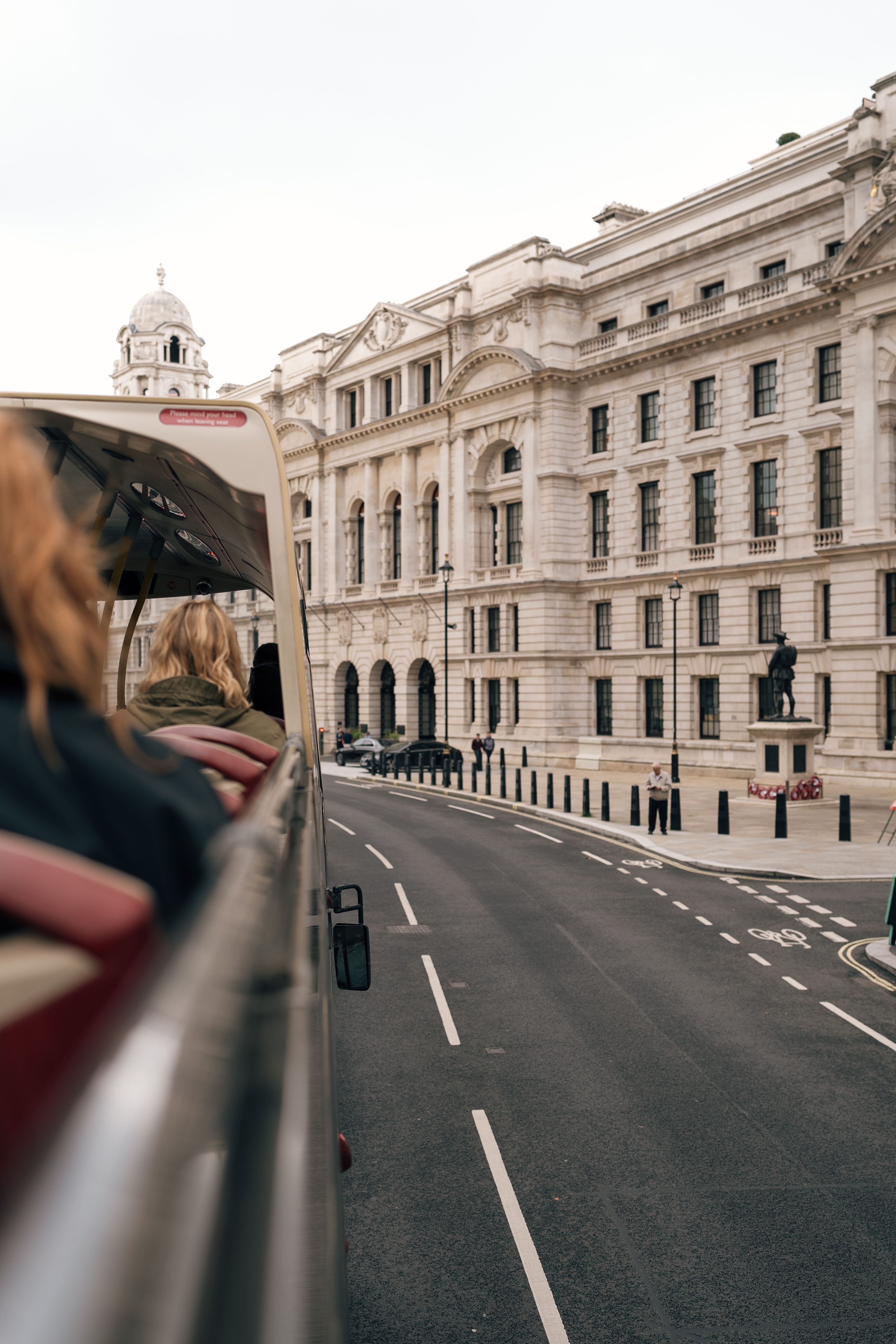 Open-Top Bus Tour in Historic Cityscape · Free Stock Photo