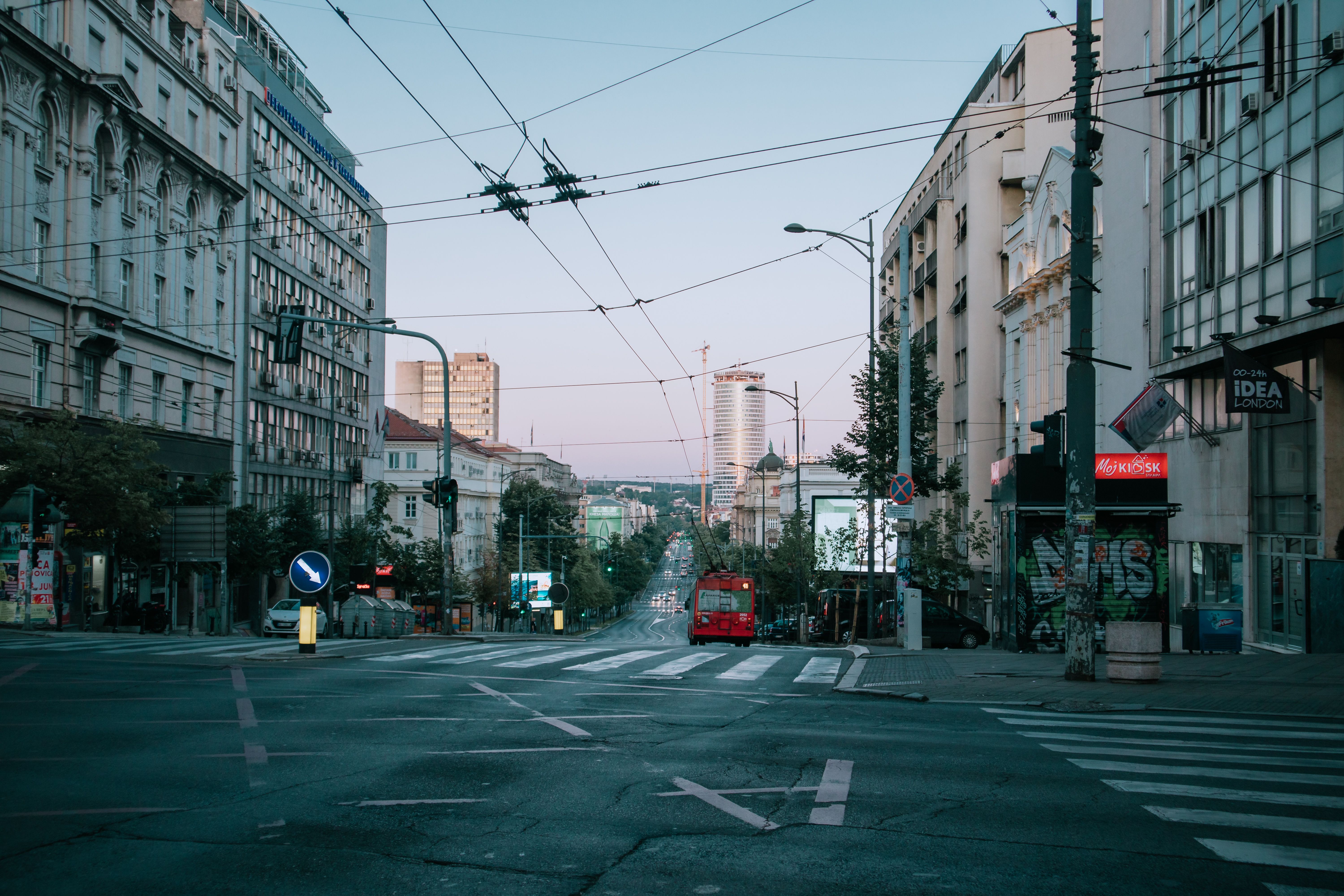 Urban Street Scene at Dawn with City Buildings · Free Stock Photo