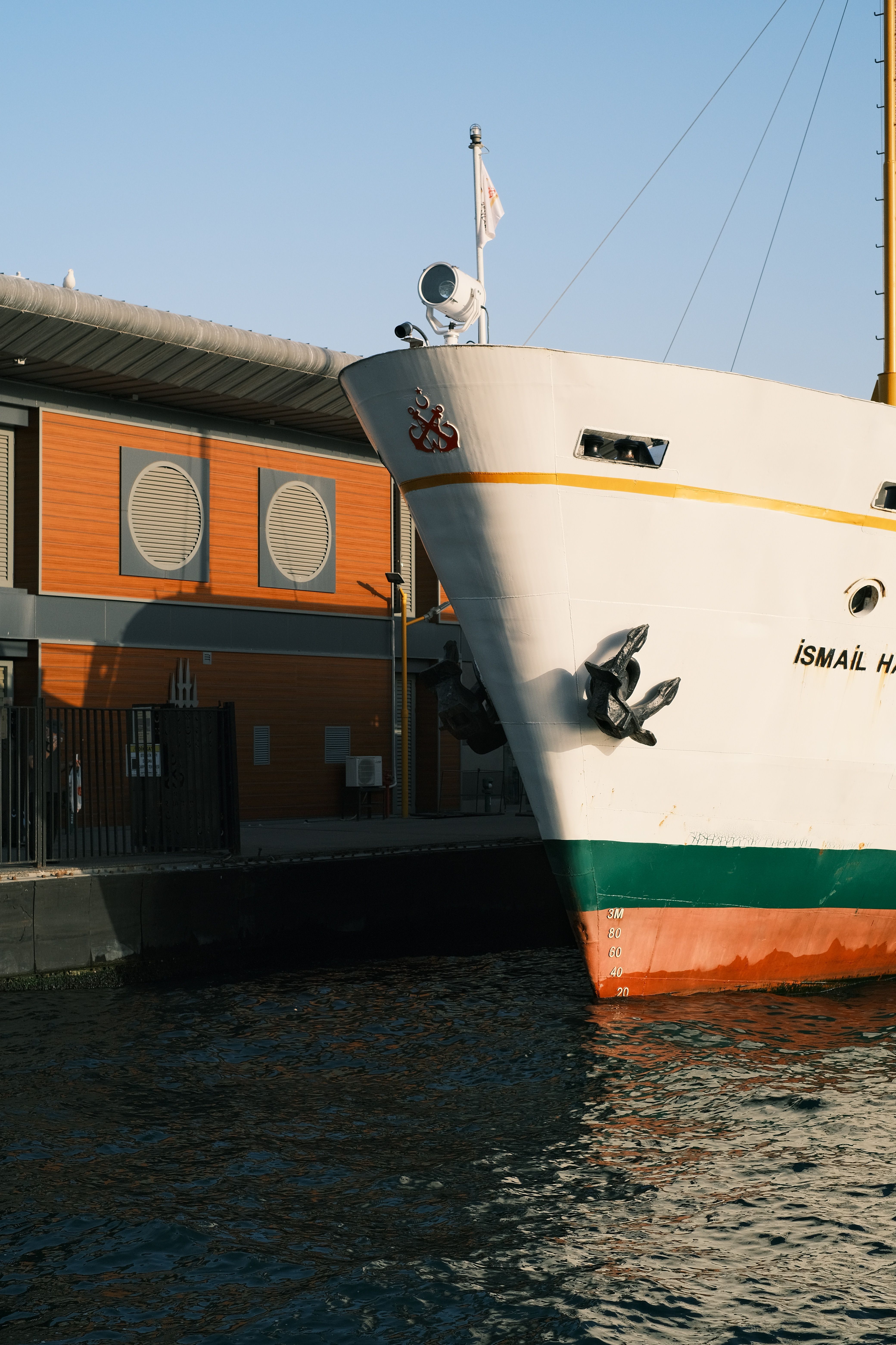 Docked Ship at Waterfront Building During Daytime · Free Stock Photo