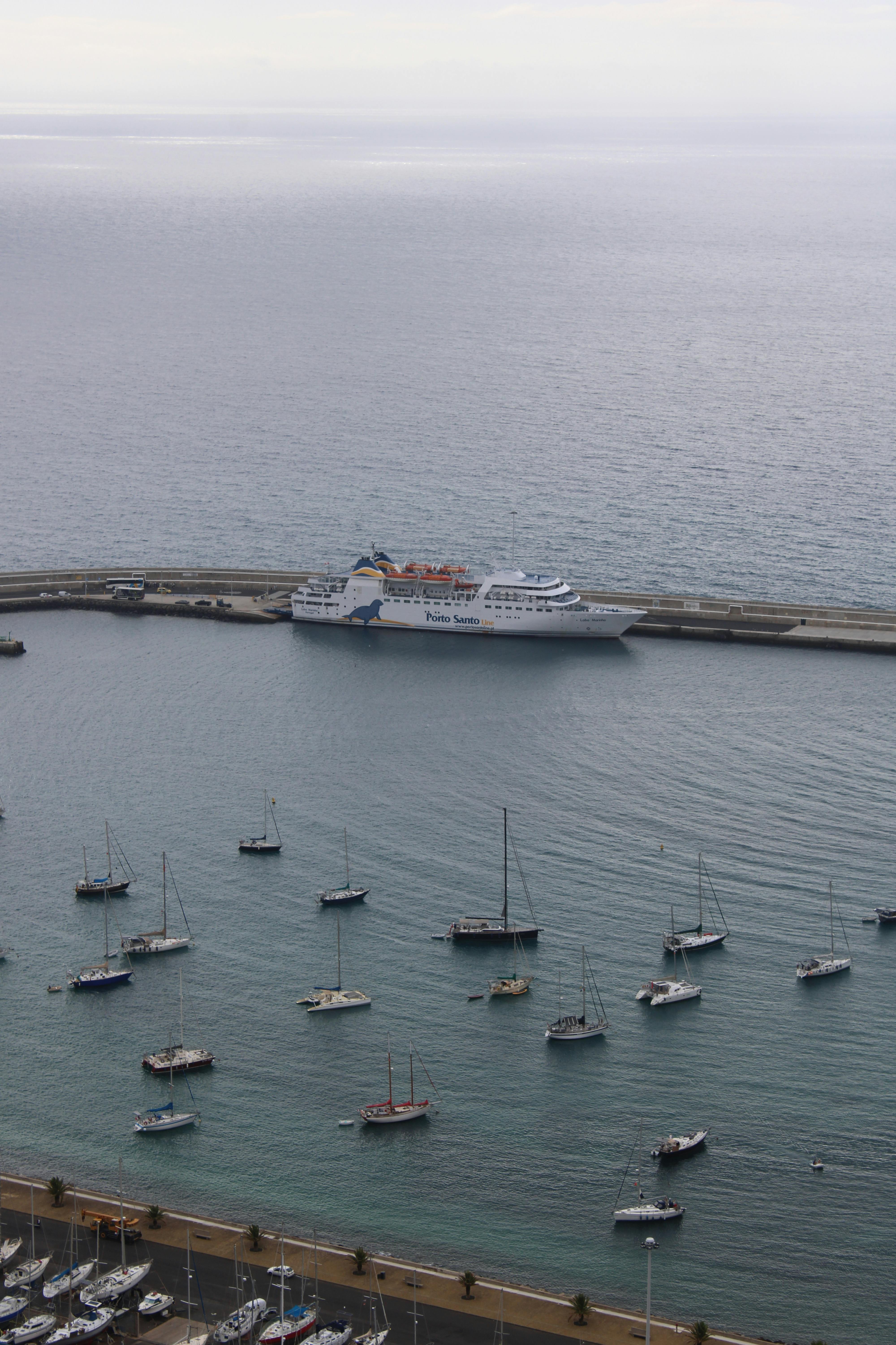 Aerial View of Harbor with Docked Ferry and Yachts · Free Stock Photo