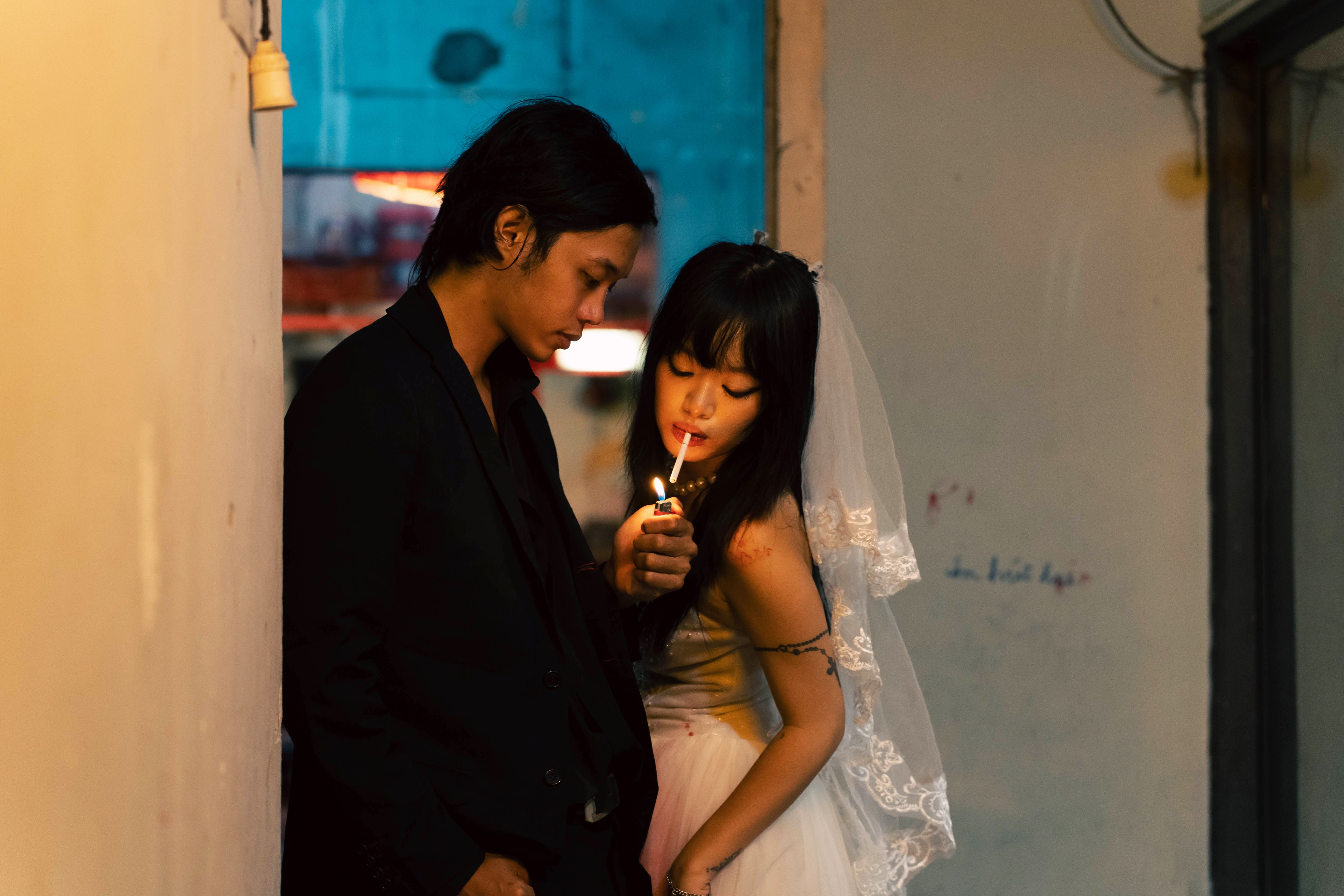 Dramatic Urban Wedding Moment: Bride Smokes · Free Stock Photo