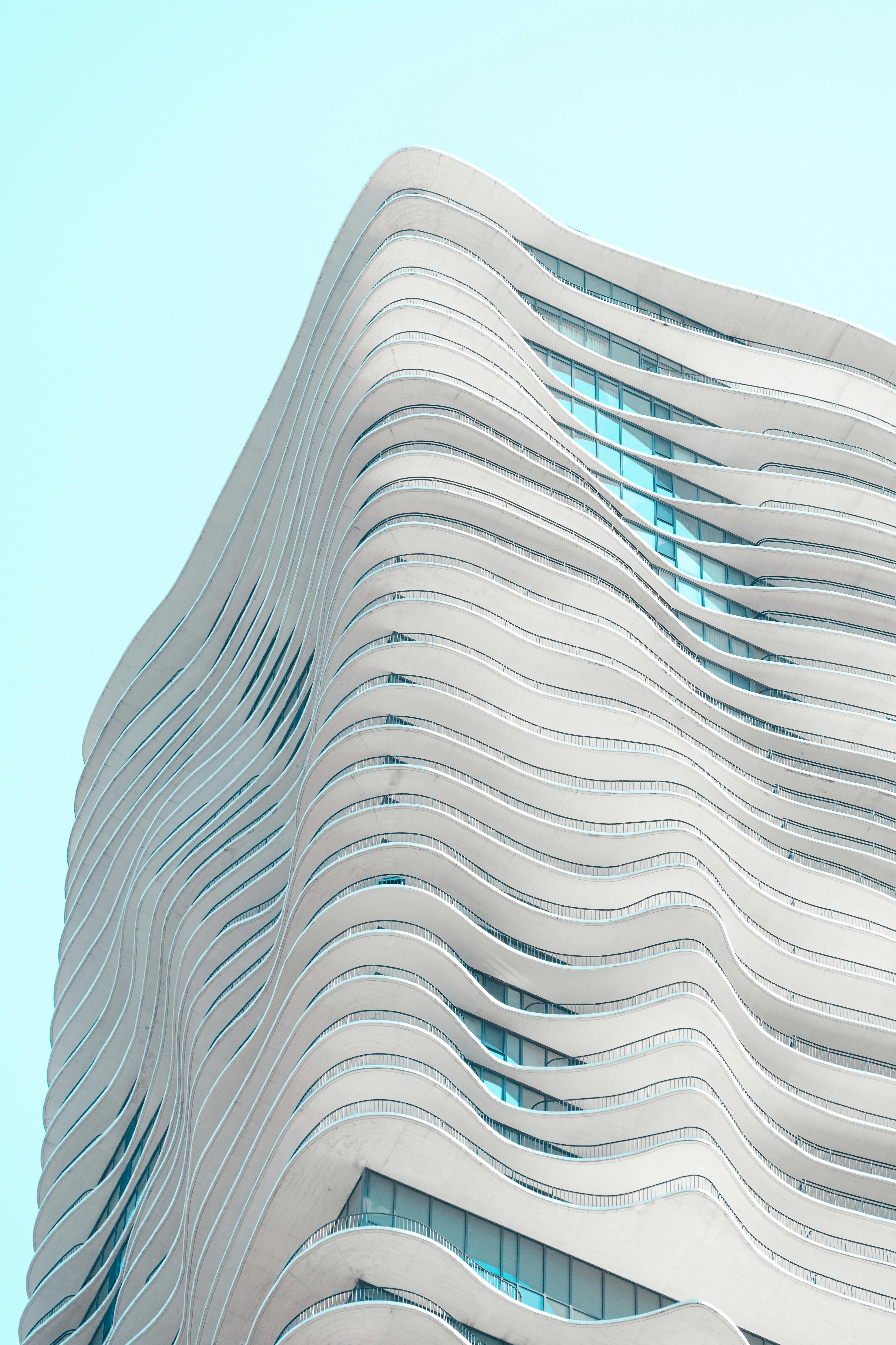 Modern Architectural Wave Design Skyscraper · Free Stock Photo