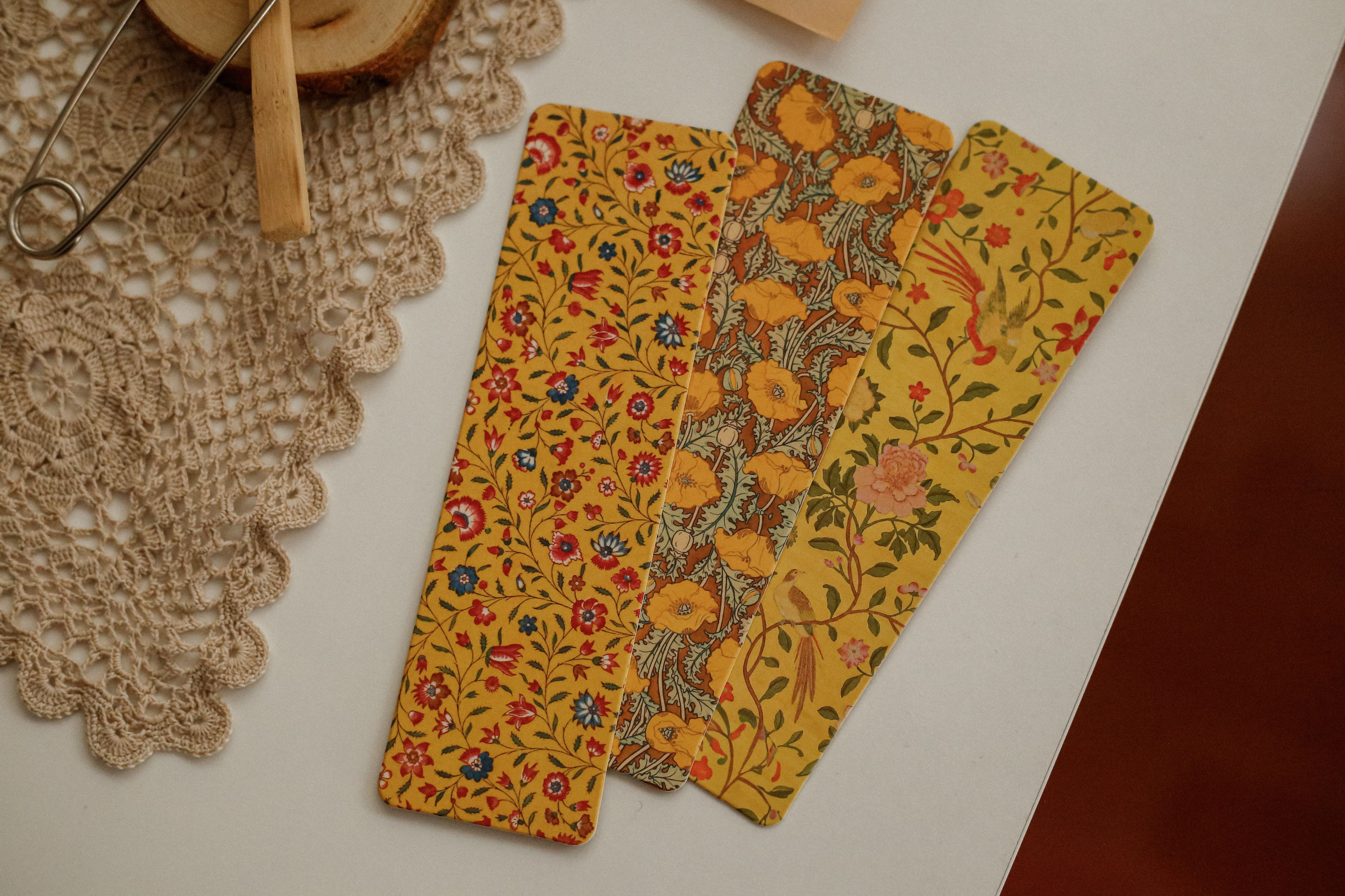 Vintage Floral Bookmarks on Crochet Doily · Free Stock Photo
