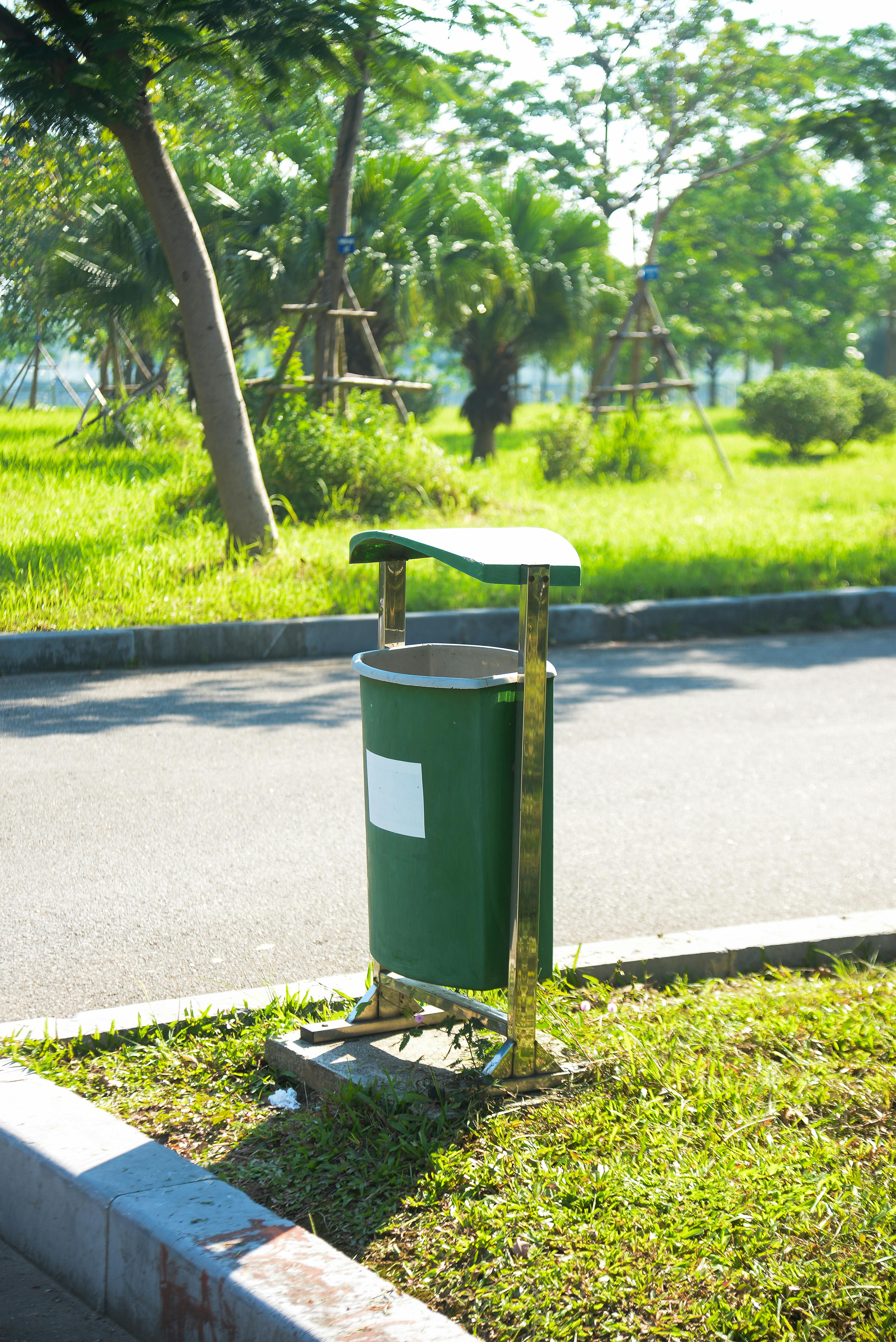 Green Trash Bin on Sunny Park Path · Free Stock Photo