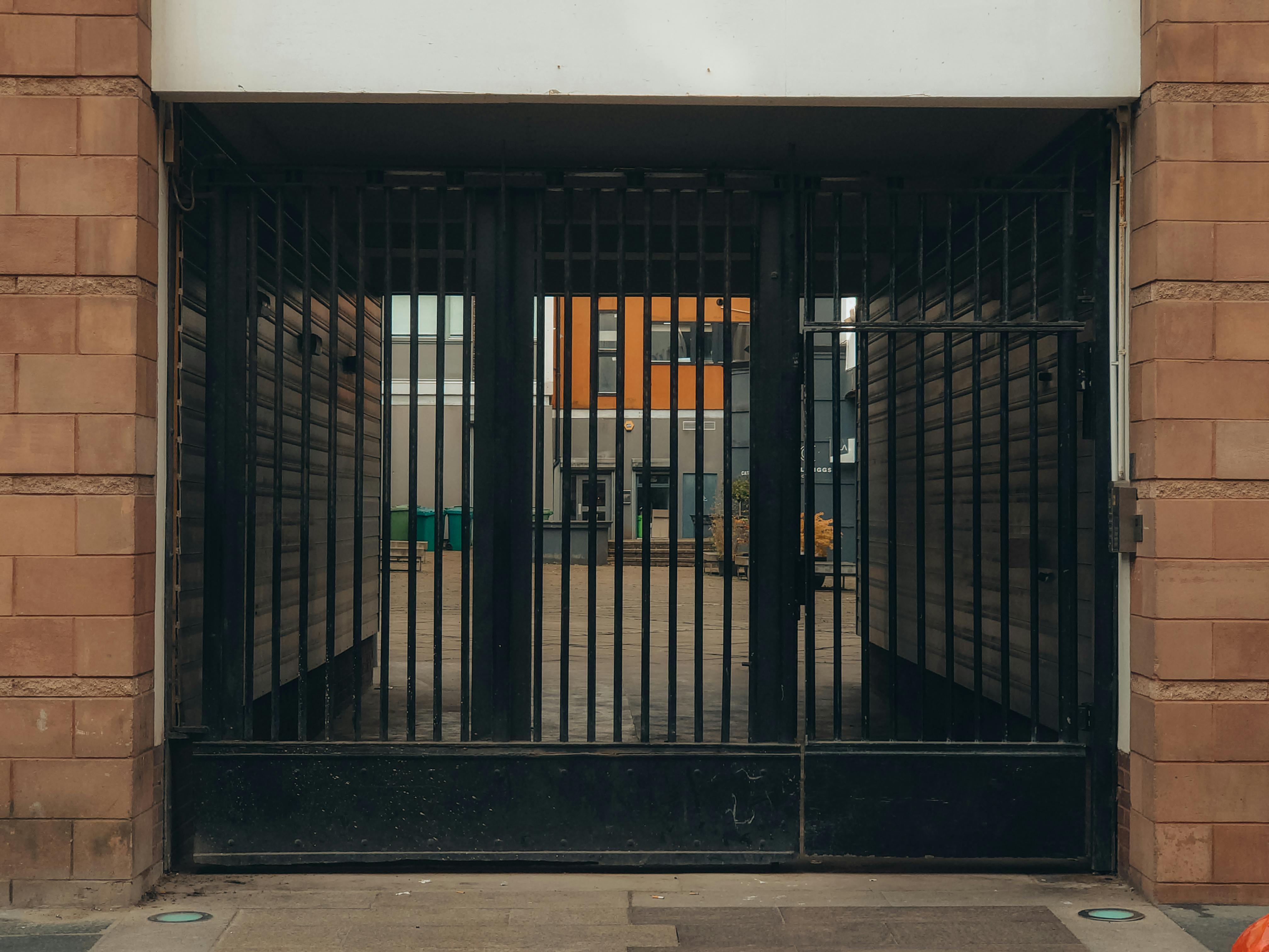 Secure Entrance Gate to Urban Courtyard · Free Stock Photo