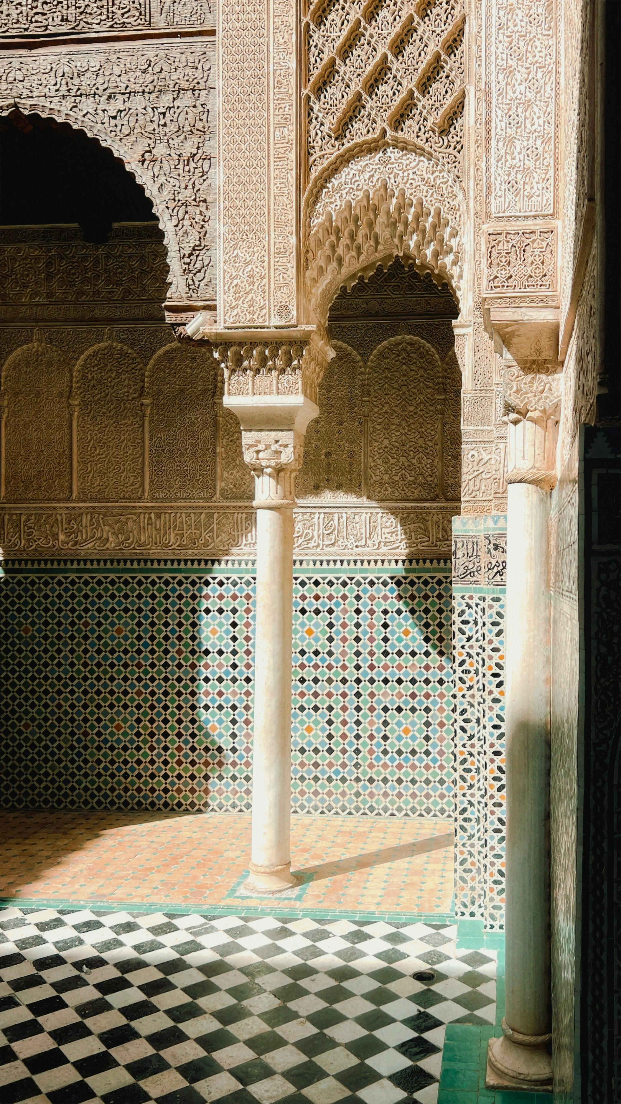 Intricate Moorish Architecture with Sunlit Patterns · Free Stock Photo