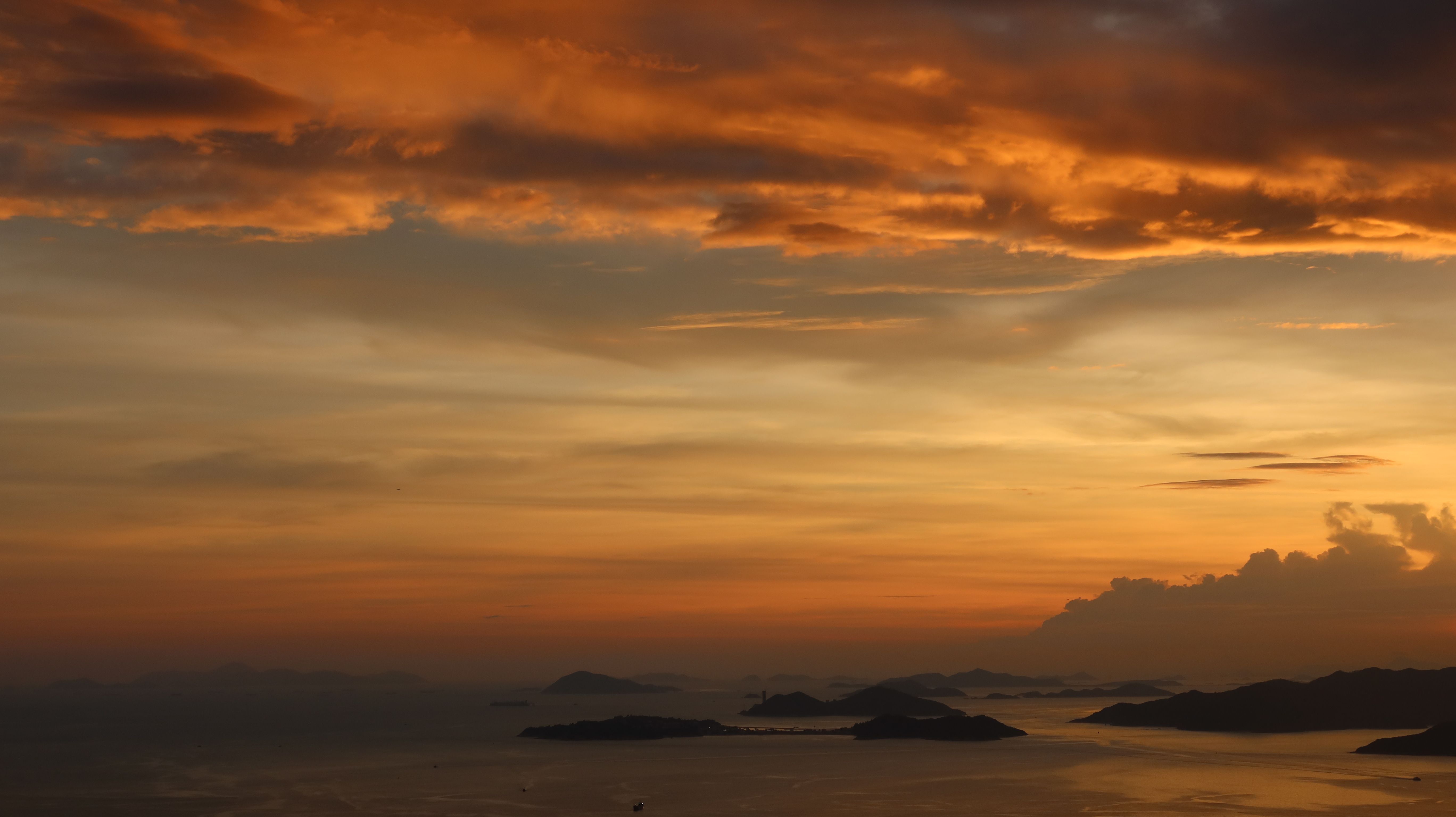 Dramatic Orange Sunset Over Serene Ocean · Free Stock Photo