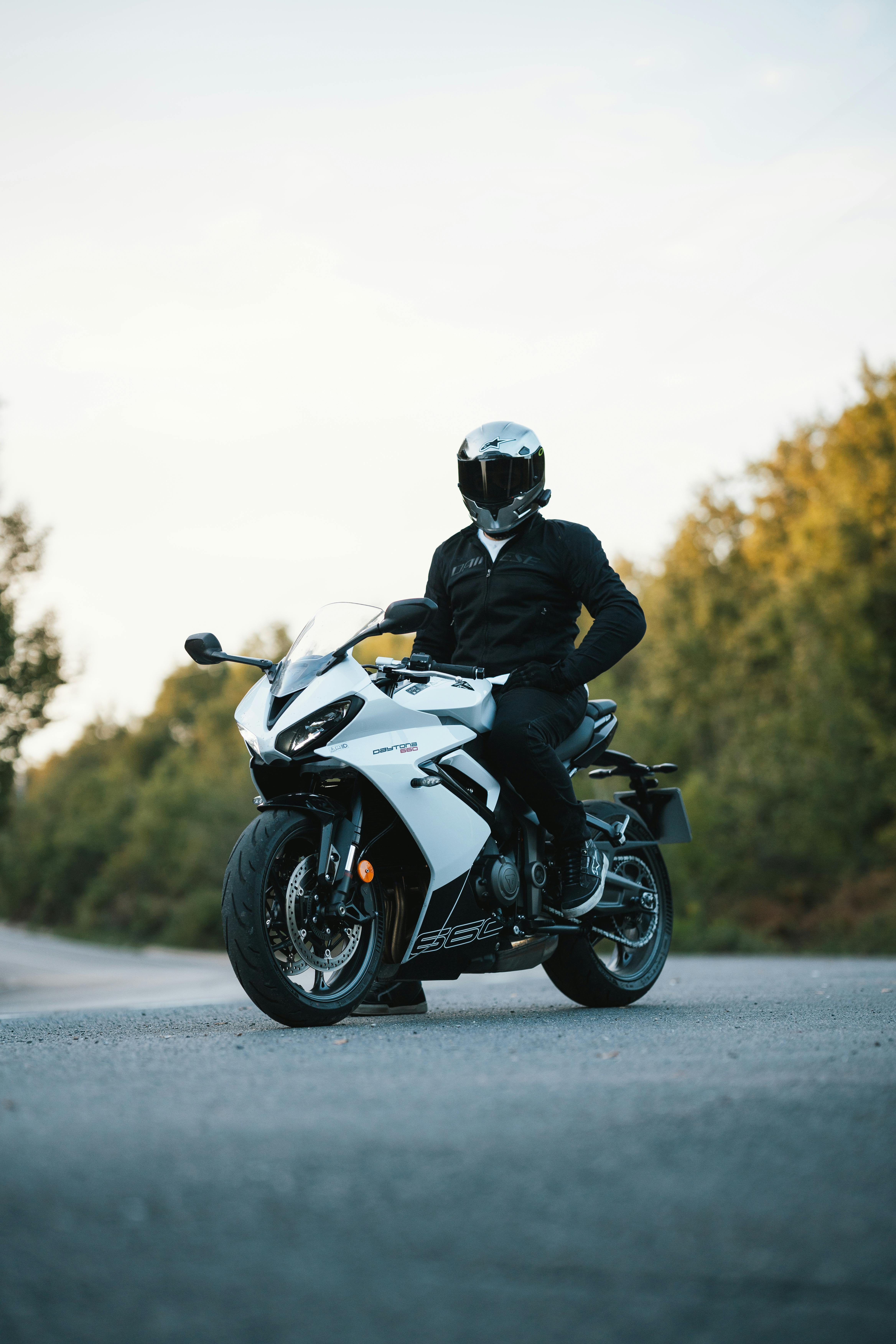 Motorcyclist on Sport Bike on Open Road · Free Stock Photo