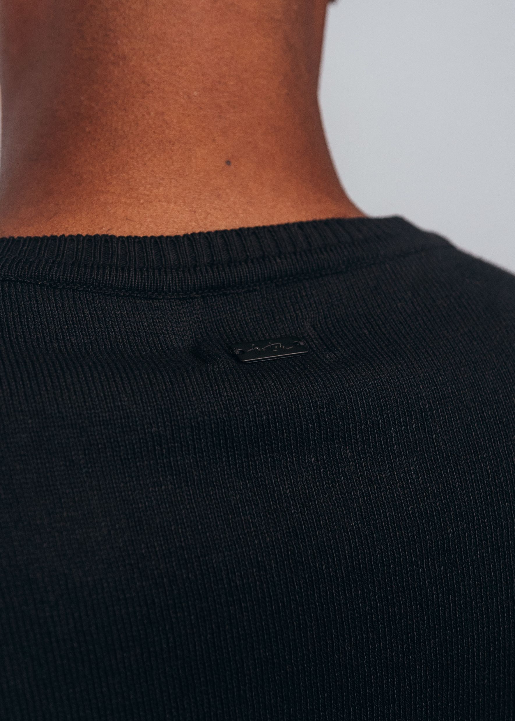 Close-up of Black Sweater Back Design · Free Stock Photo
