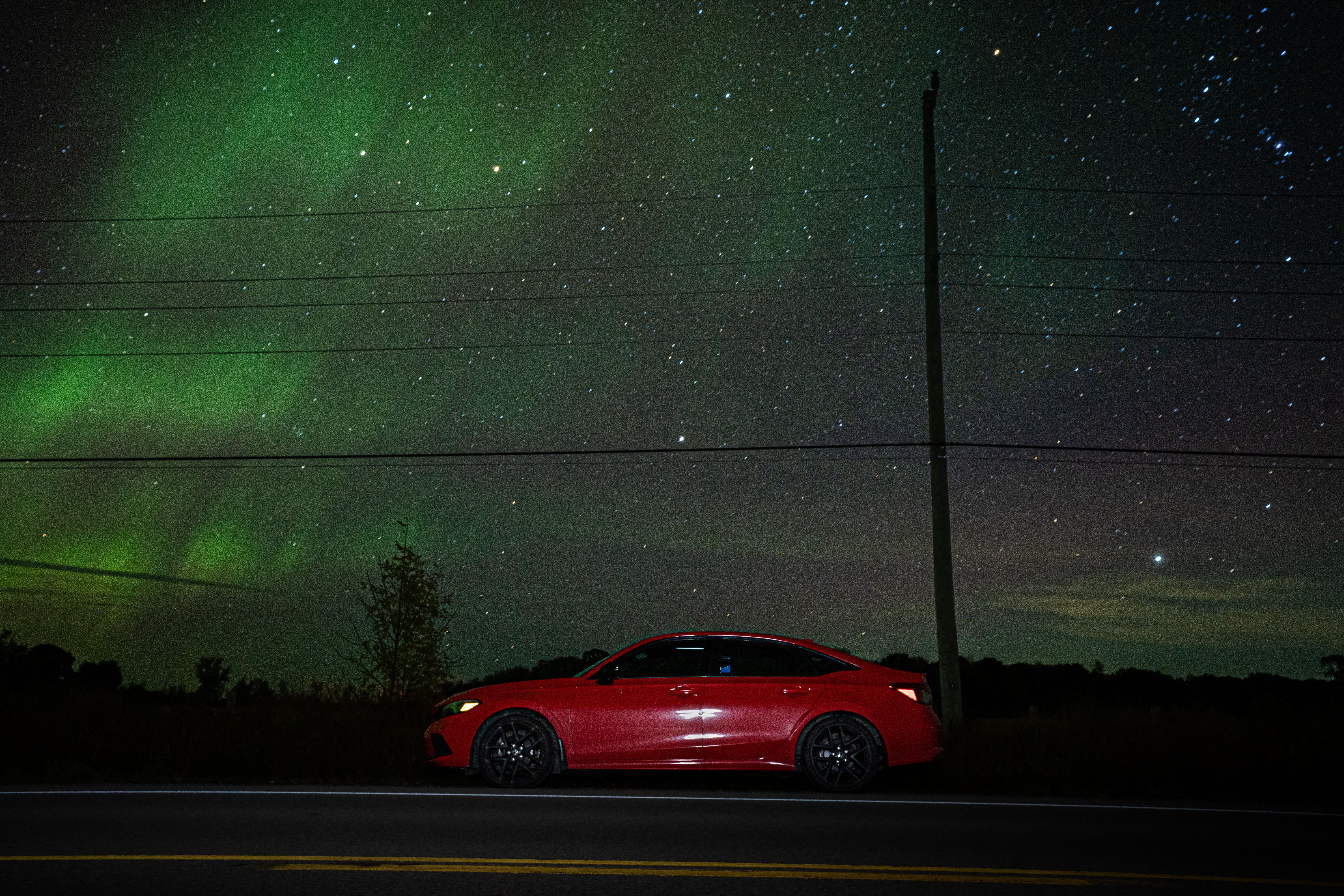 Northern Lights over Red Car in Ontario Night Sky · Free Stock Photo