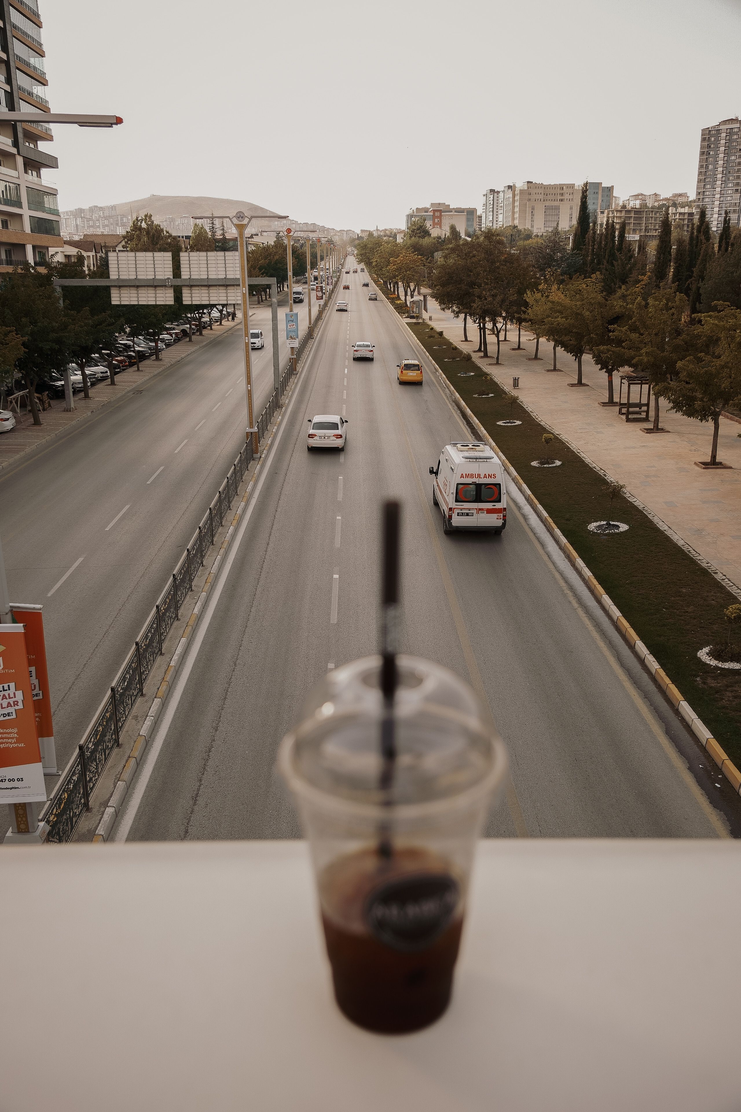 Aerial View of Busy Highway with Coffee Cup · Free Stock Photo